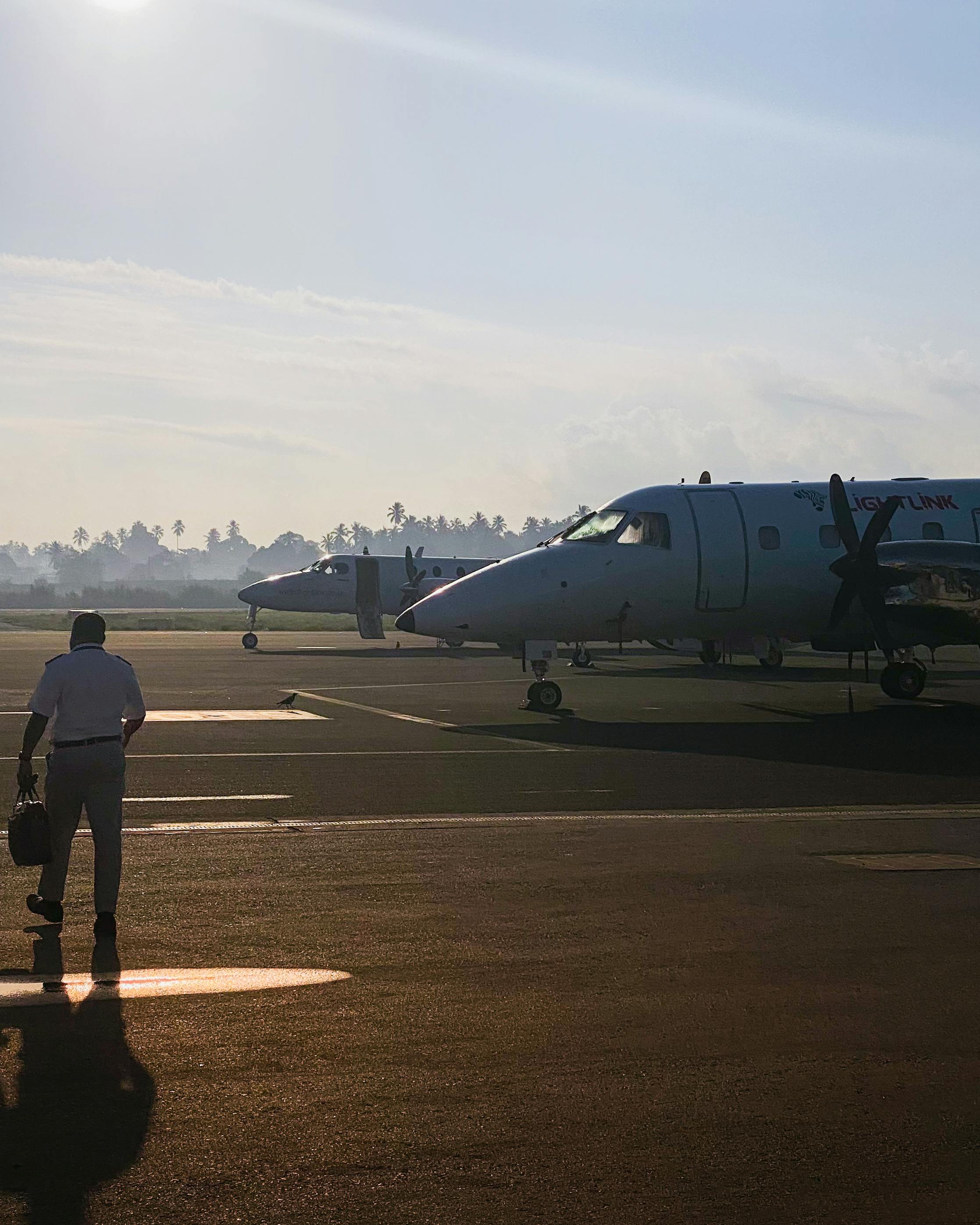 Airplanes on an Airstrip · Free Stock Photo