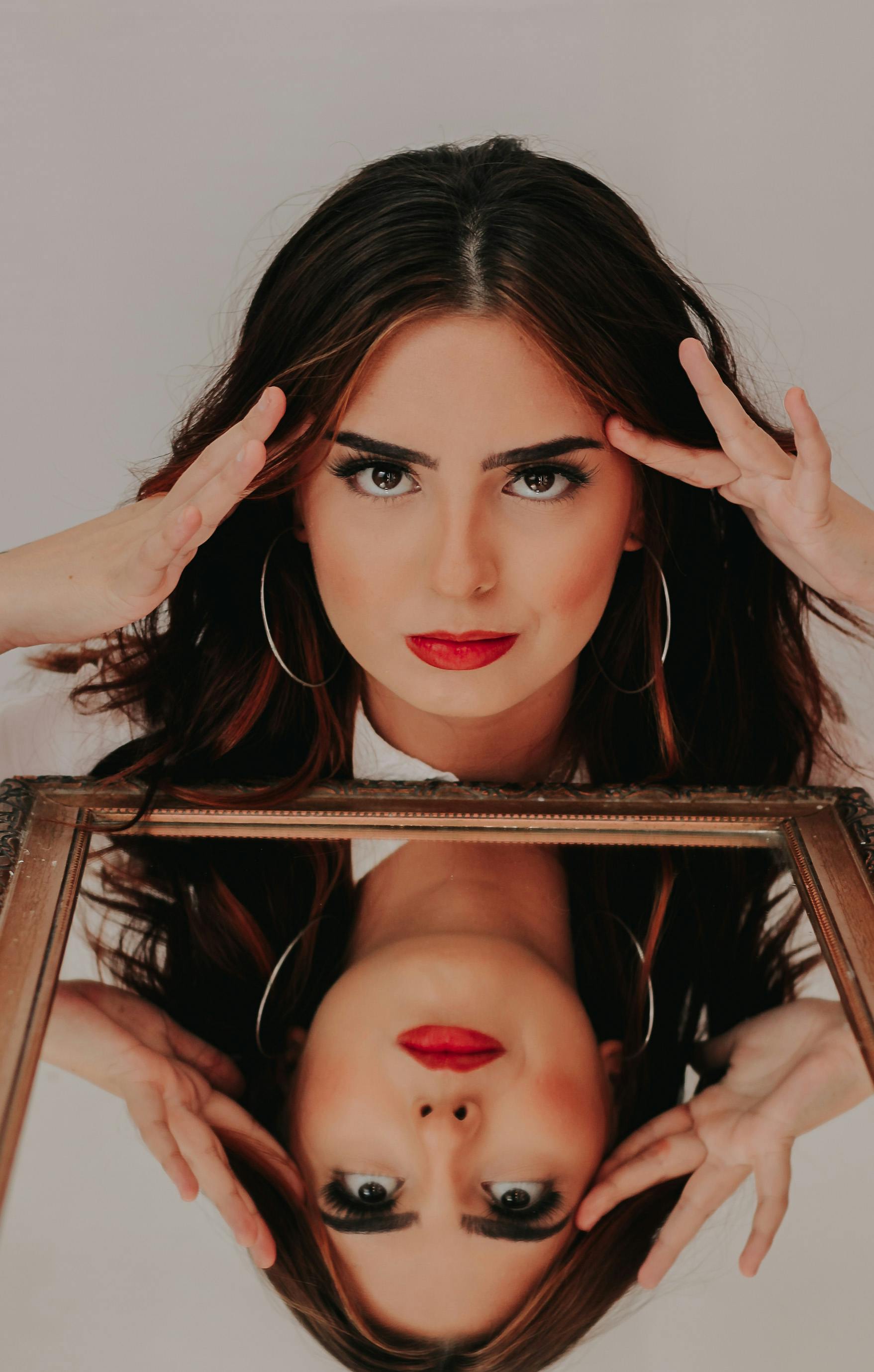 Attractive Woman in Streetwear Posing while Looking at Camera · Free ...