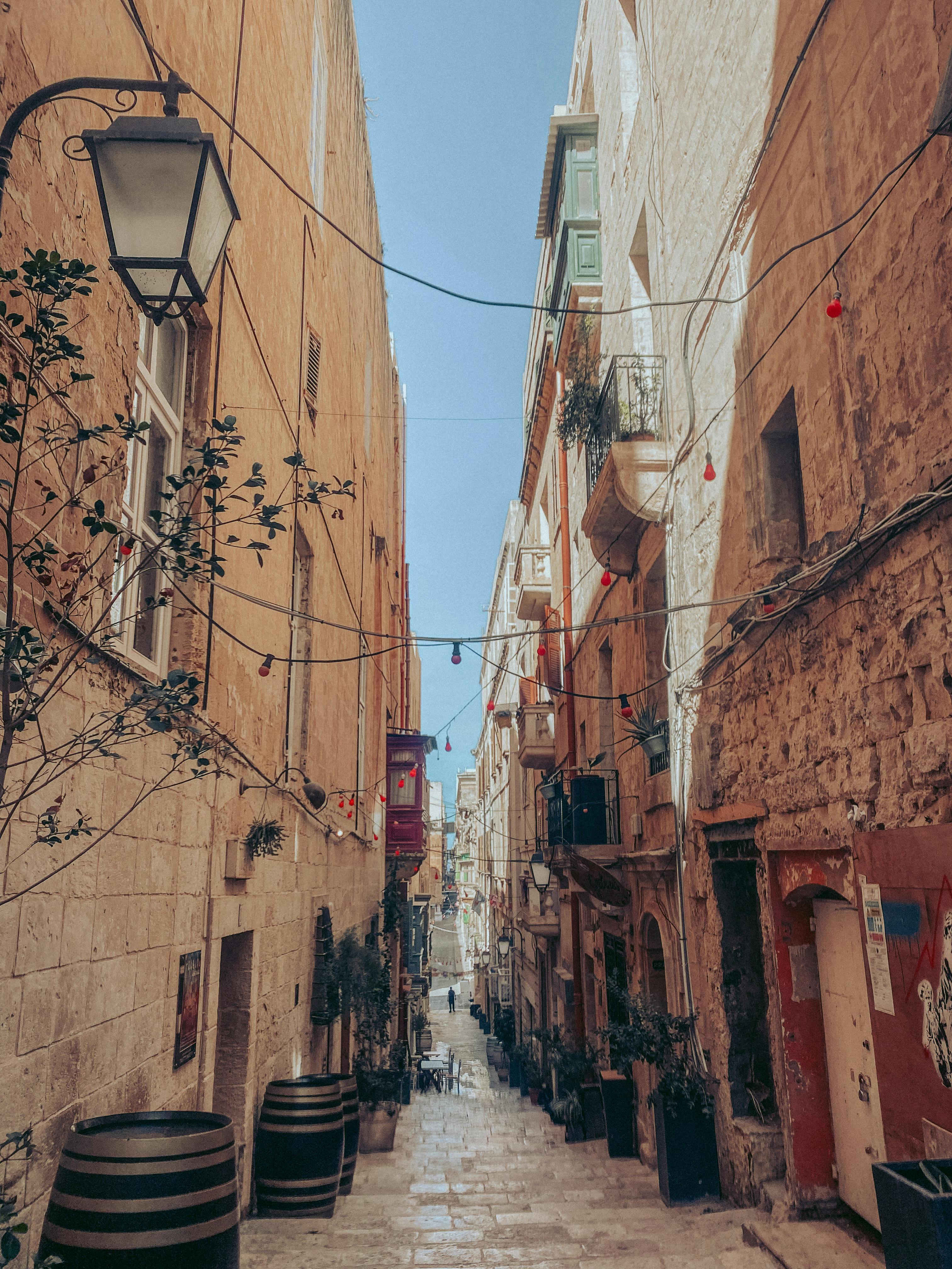 Small Alley in Between Buildings · Free Stock Photo