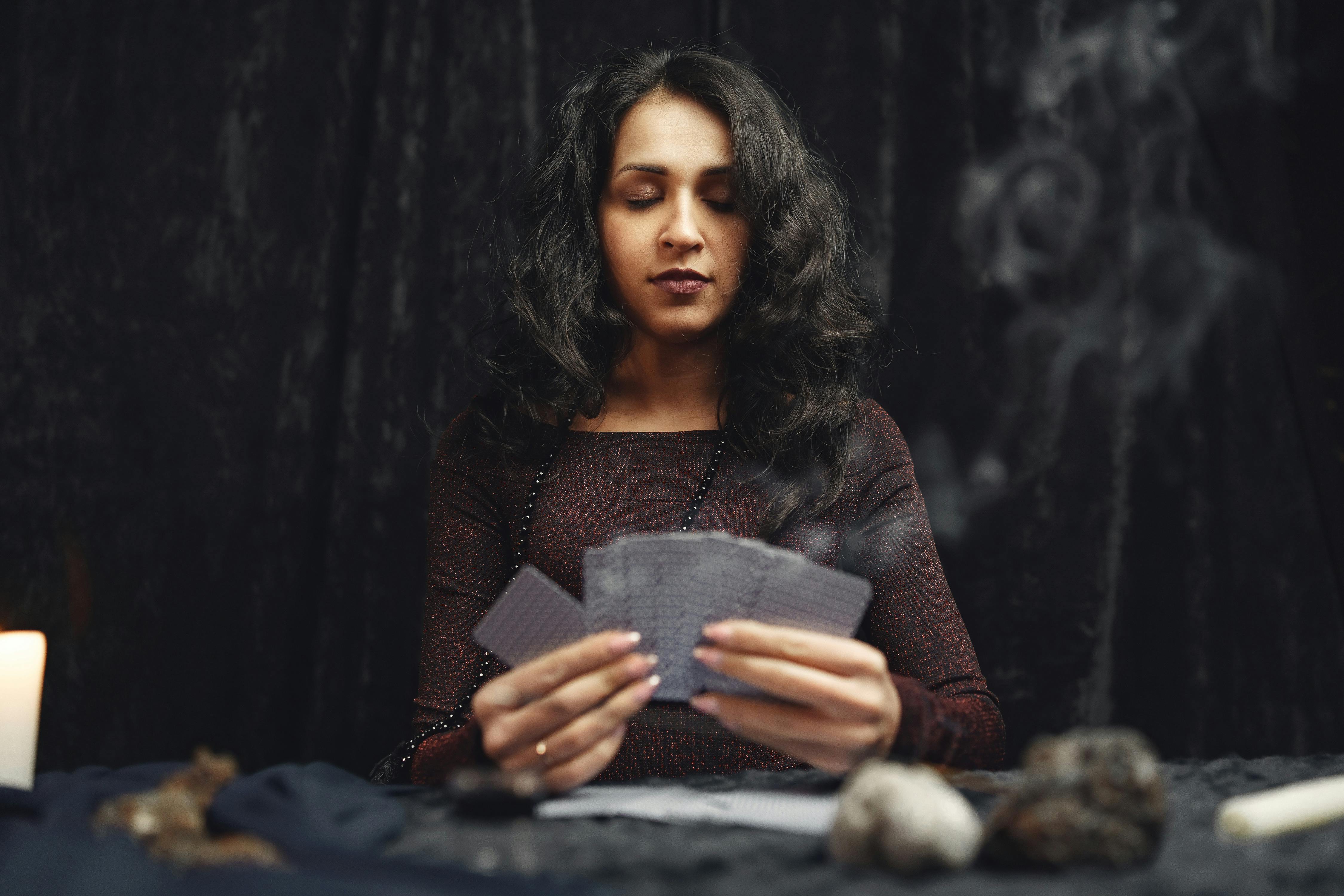 Woman Doing a Card Reading · Free Stock Photo