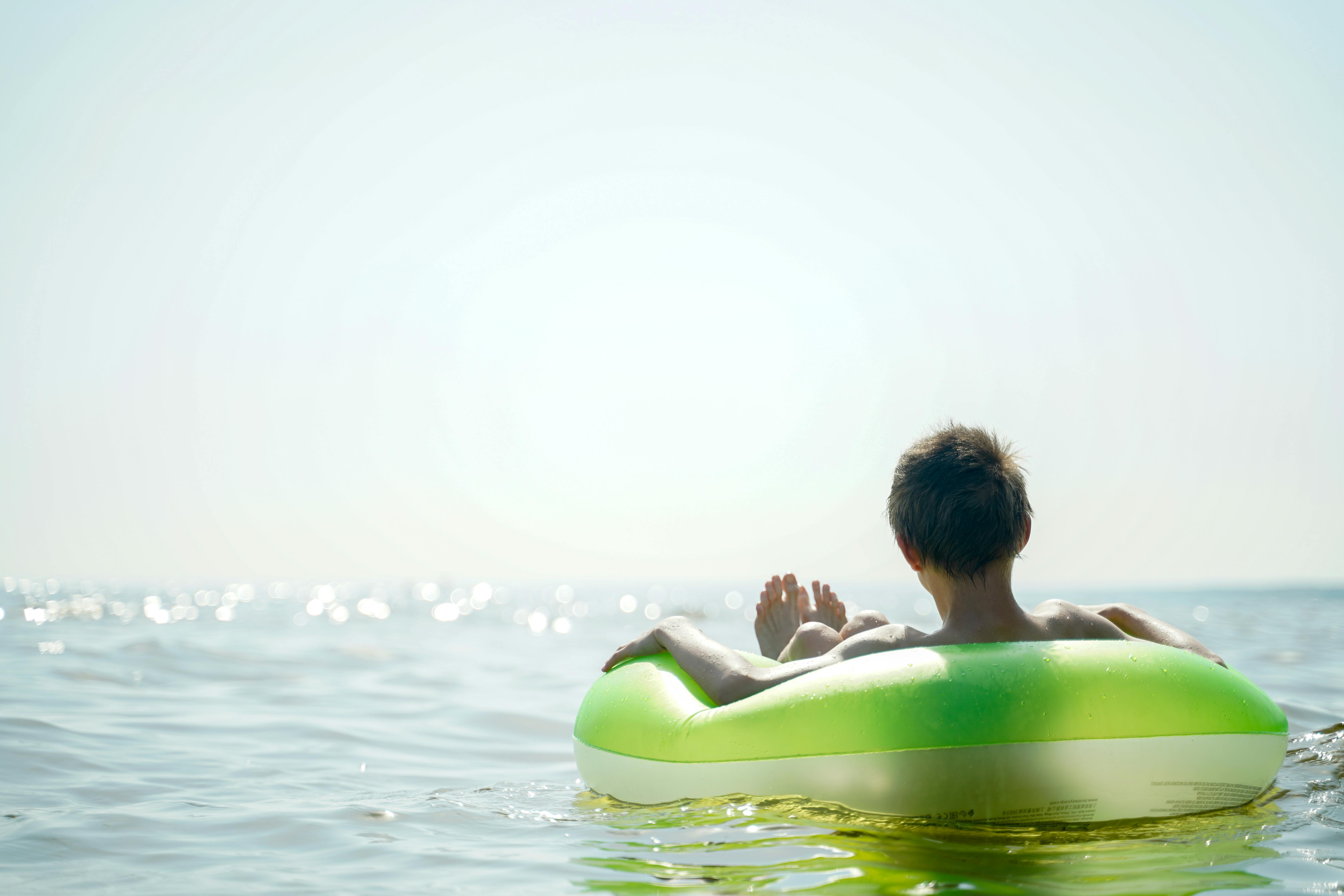 A Human Hand Off The Water's Surface · Free Stock Photo