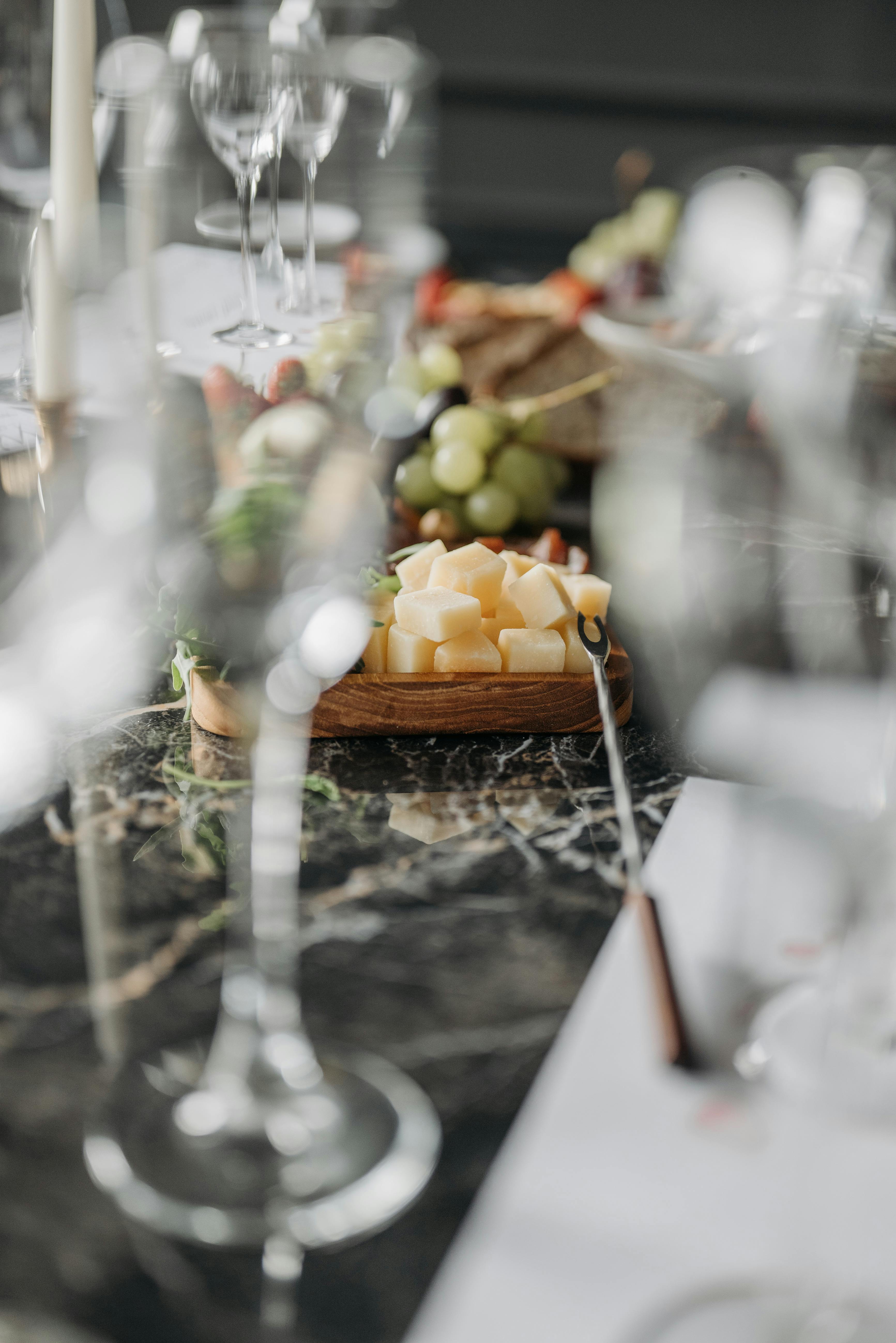 Shiny Glasses and Cheese Snacks · Free Stock Photo