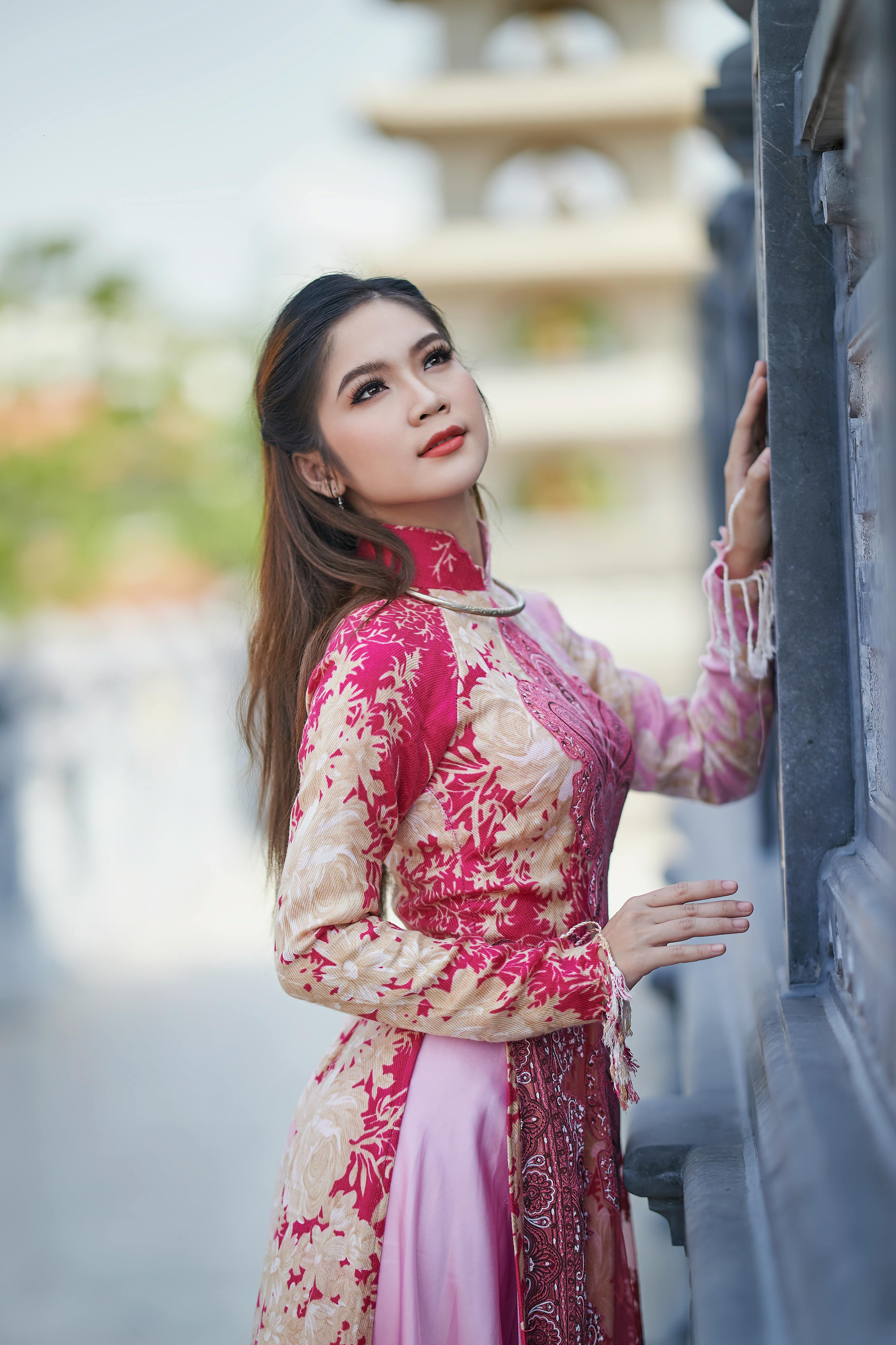 Girl Holding a Basket of Yams · Free Stock Photo