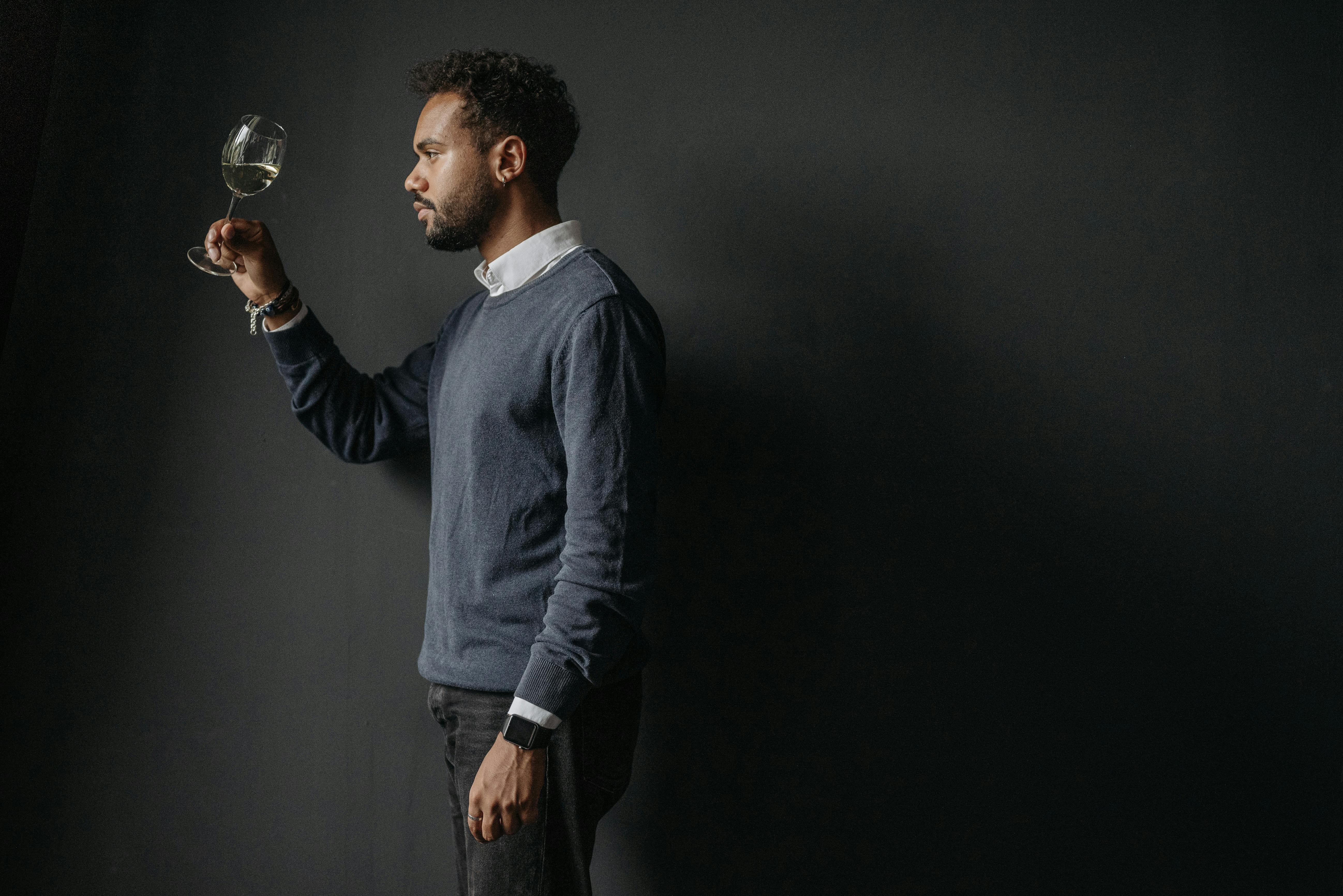 Elegant Man Drinking Red Wine · Free Stock Photo