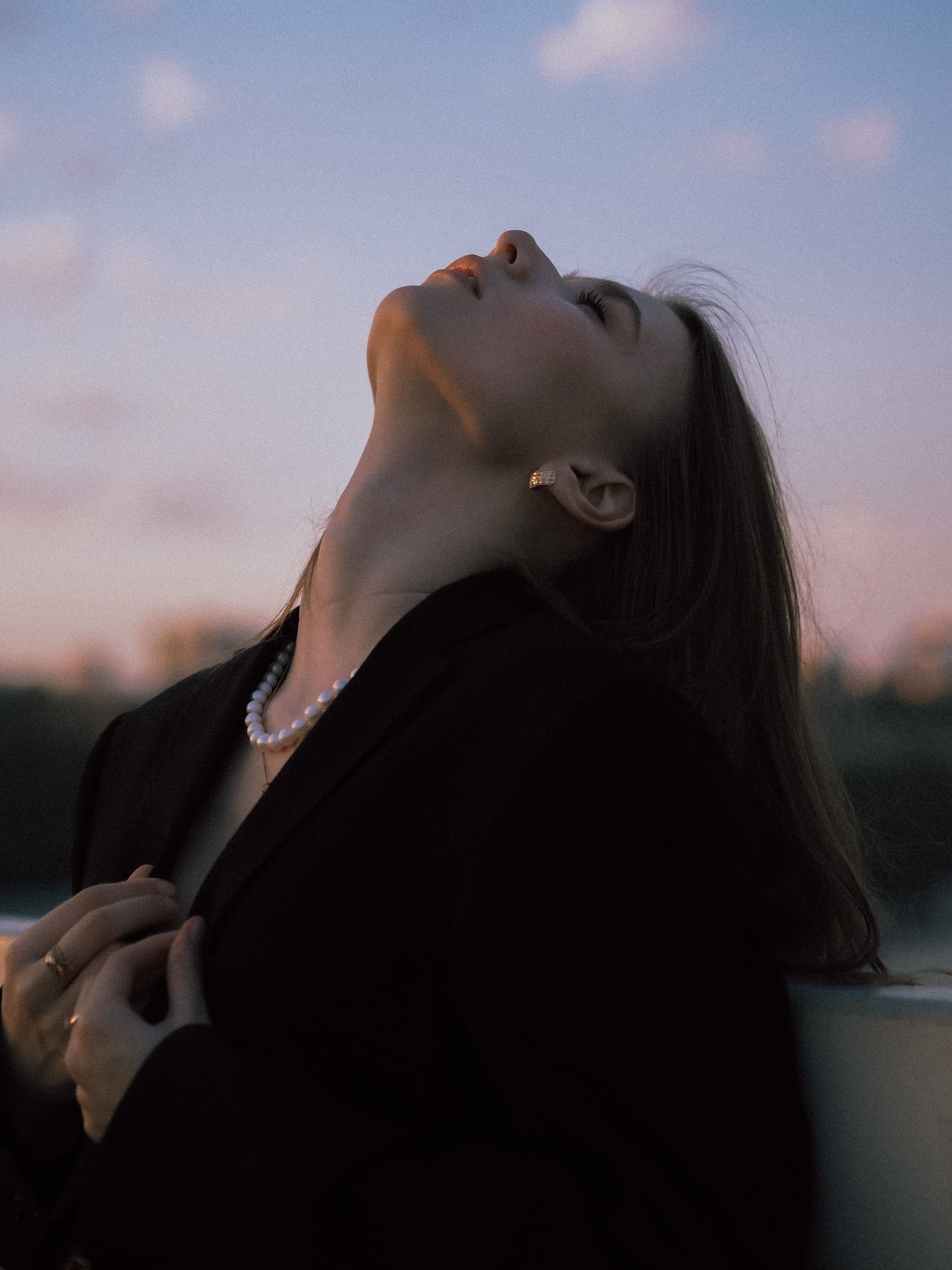Woman Looking Upward with Eyes Closed · Free Stock Photo