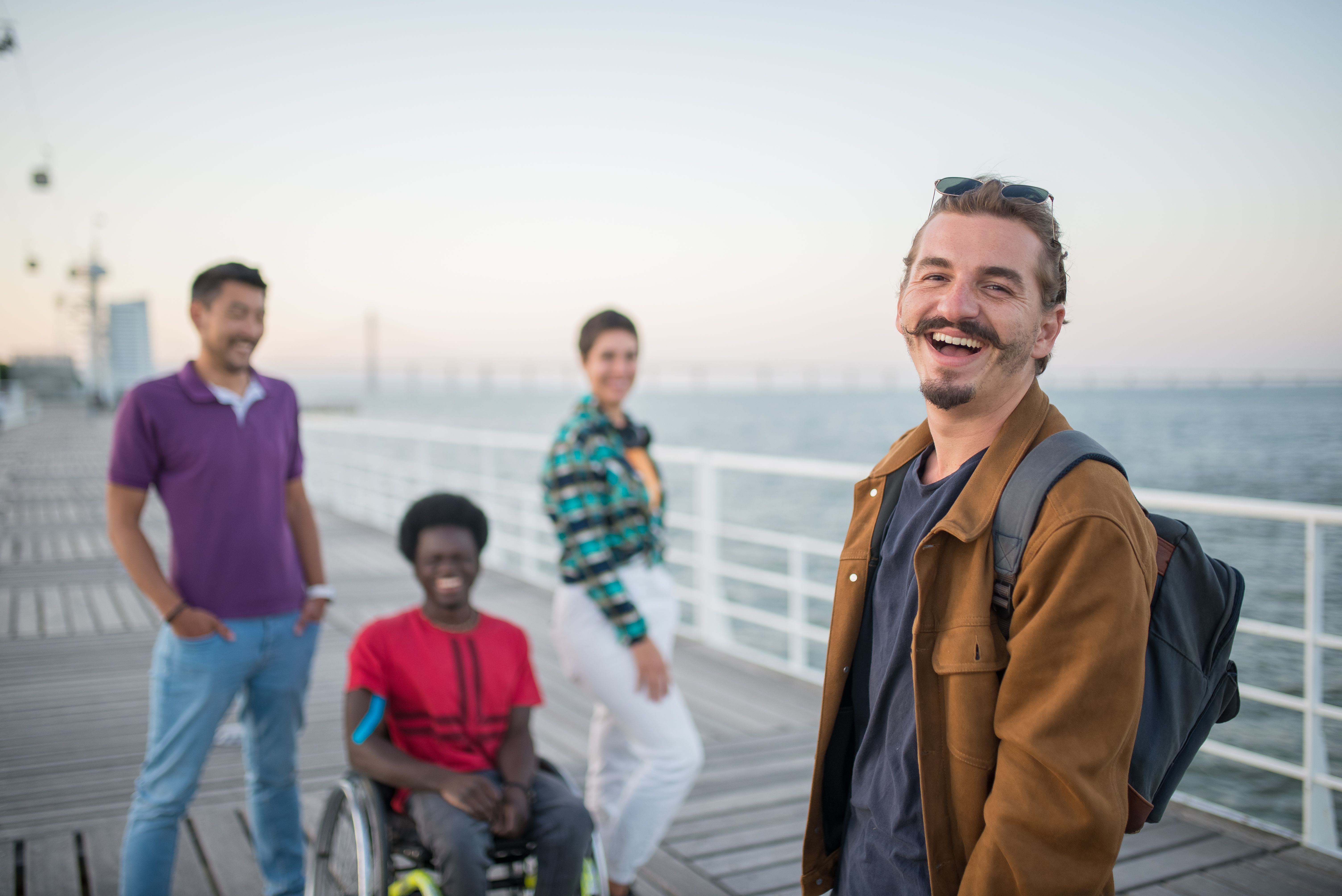 Smiling Man with Moustache Posing on Pier in Port · Free Stock Photo