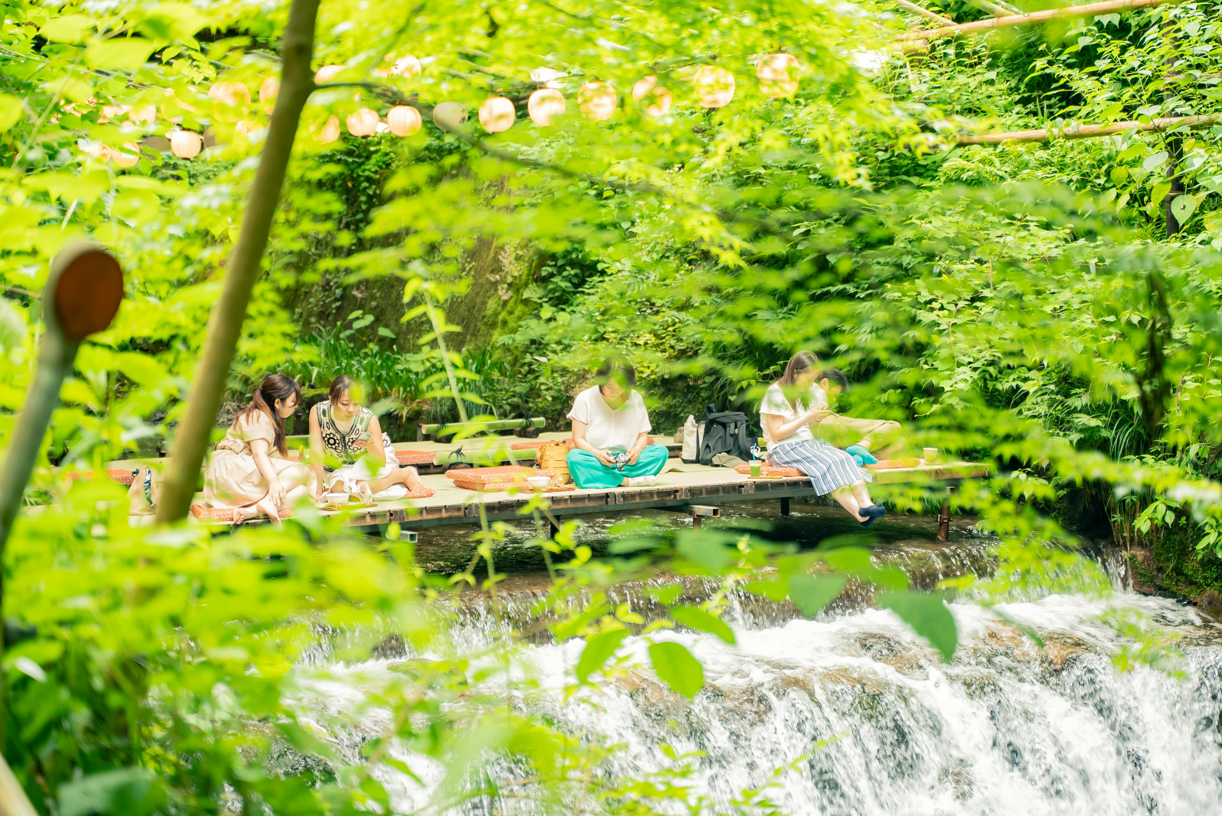 People Sitting on the River · Free Stock Photo