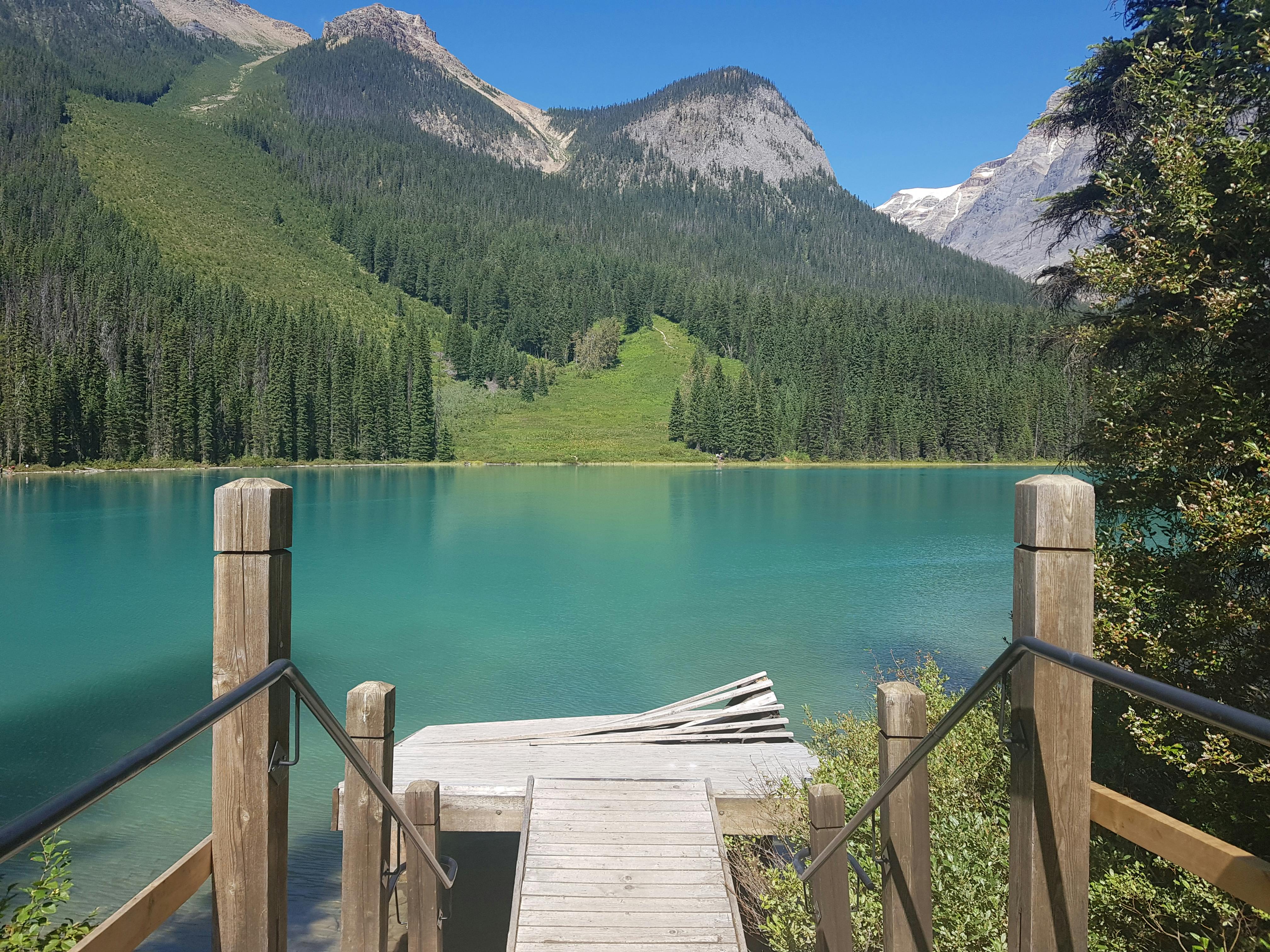 Wooden Dock on Lake Near Mountain · Free Stock Photo