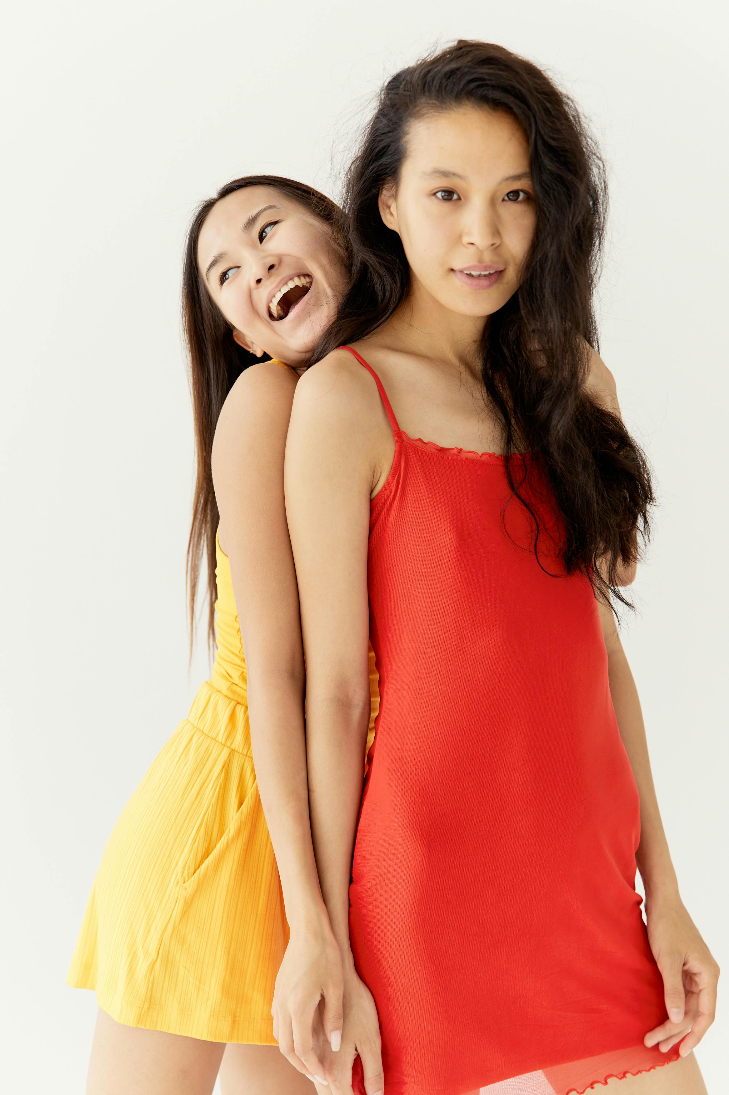 Woman Standing Behind Another Woman · Free Stock Photo