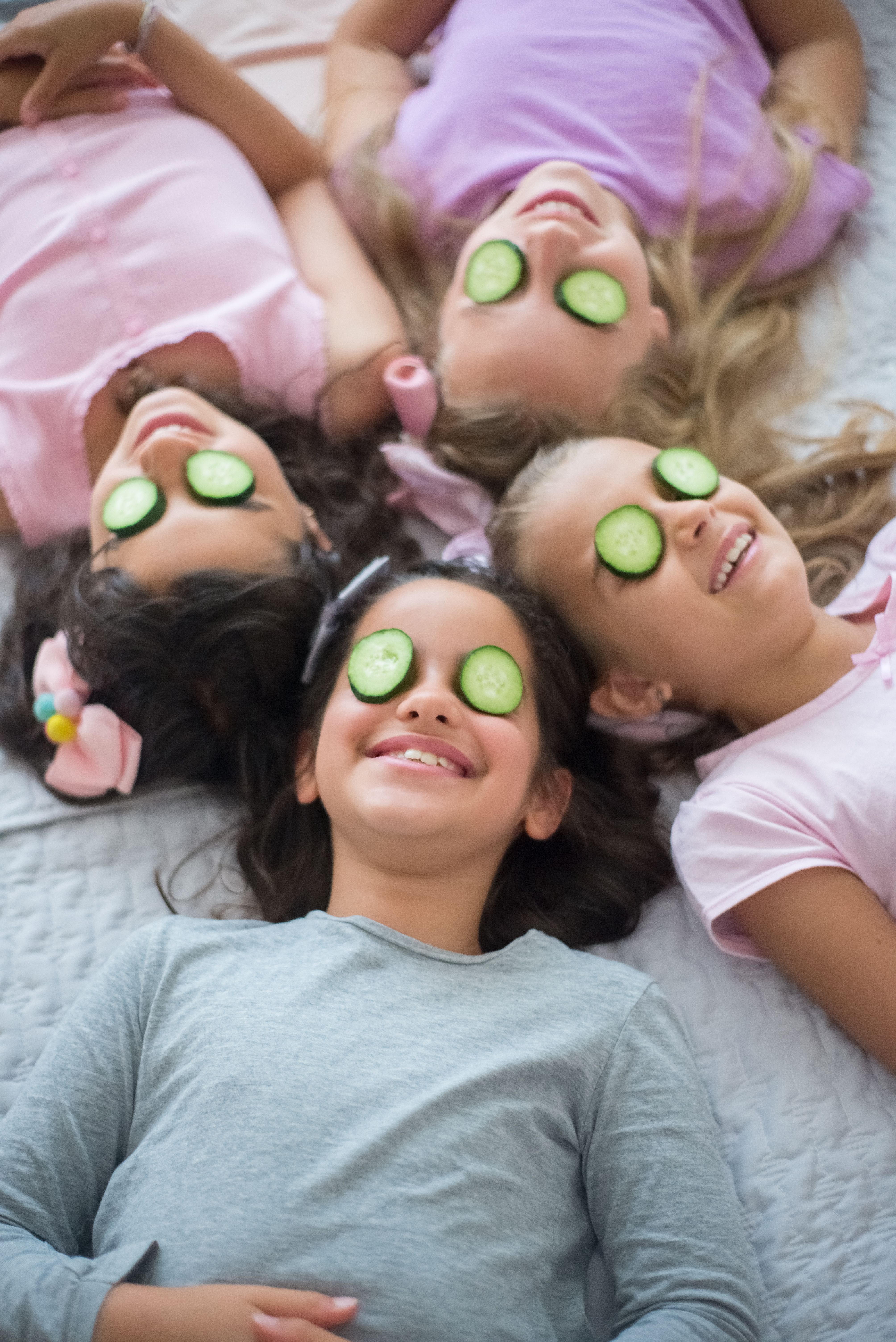 Photograph of Kids with Cucumber Masks · Free Stock Photo