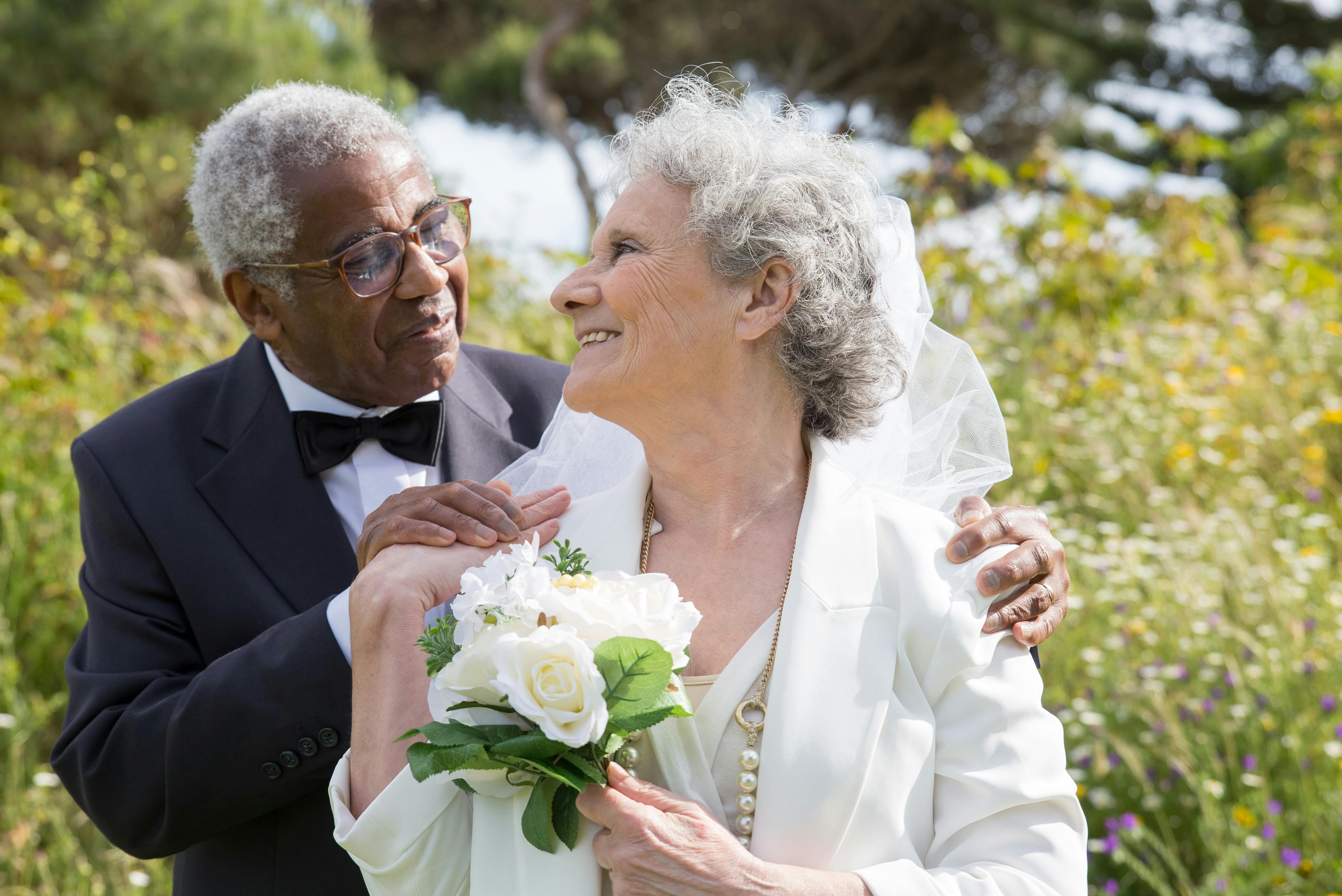 Bride and Groom Looking at Each Other Affectionately · Free Stock Photo