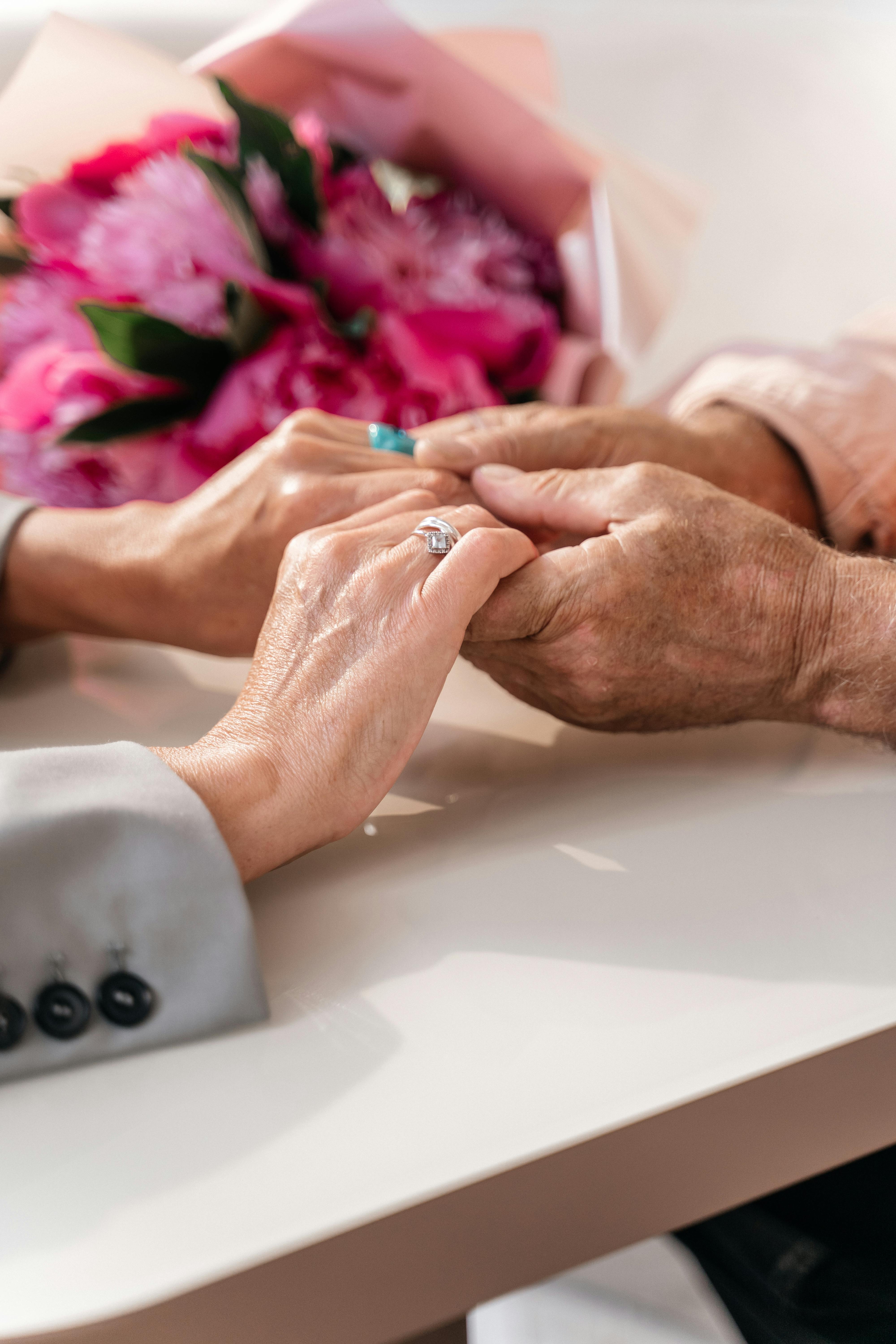 Elderly People Holding Hands · Free Stock Photo
