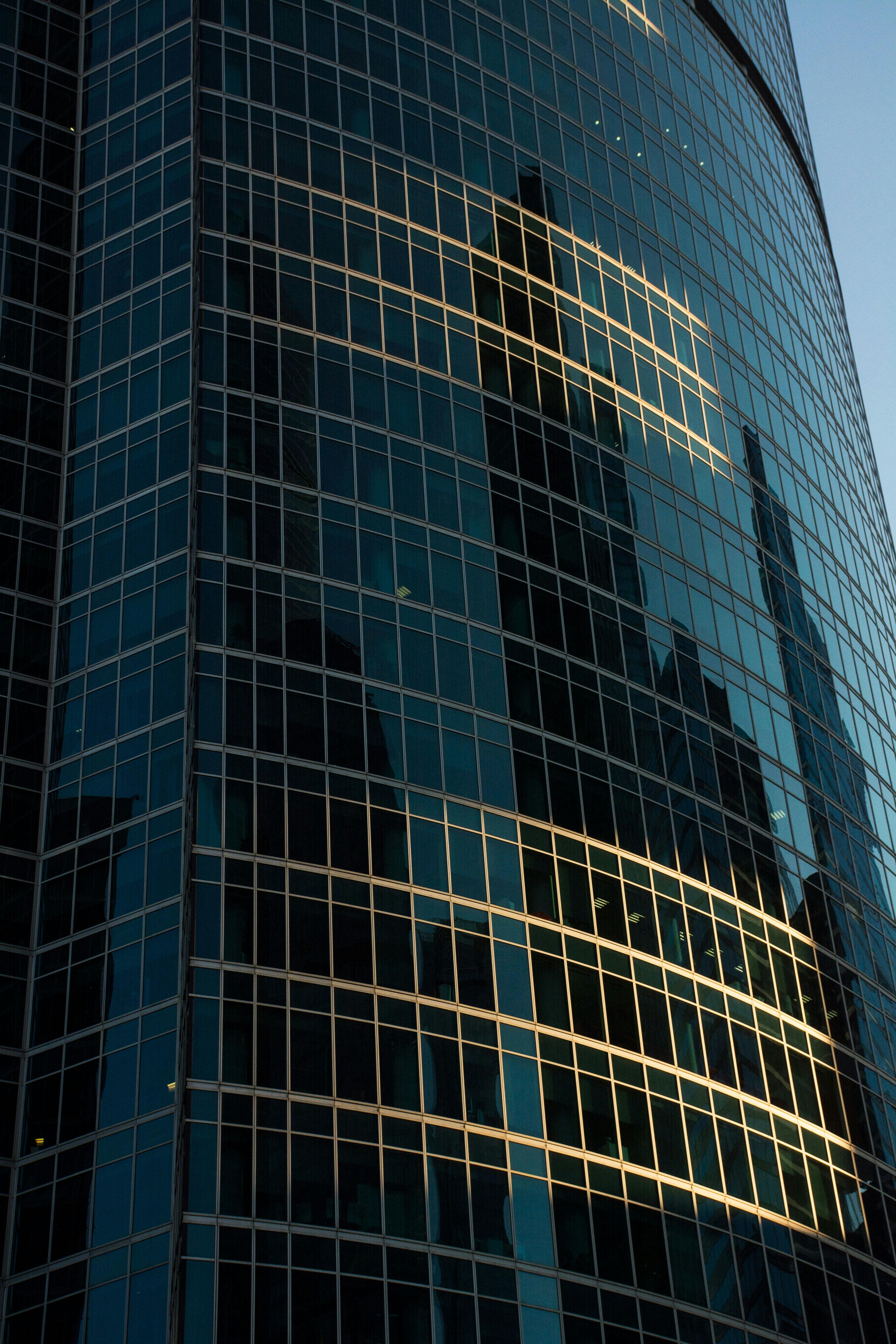 Glass Windows of the Tall Building · Free Stock Photo