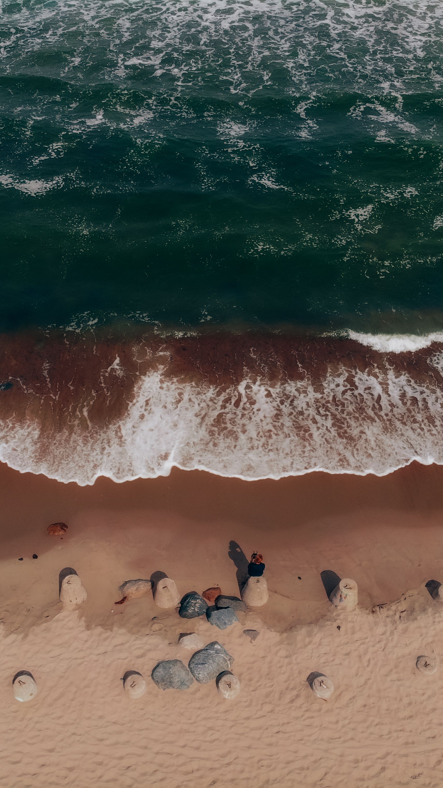 A Beautiful Woman Lying on the Sandy Shore while Looking Afar · Free ...