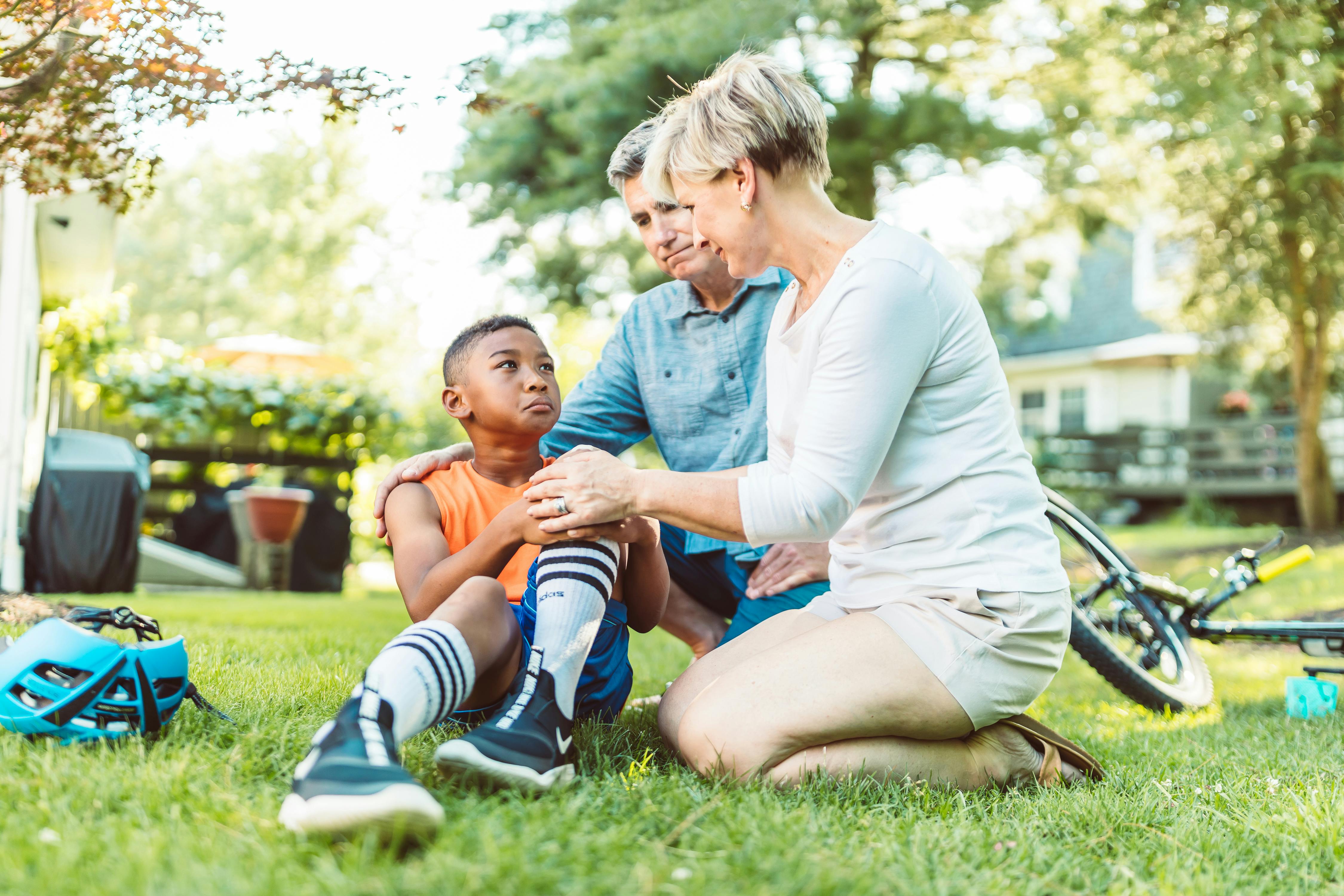 A Boy Hugging His Parents · Free Stock Photo