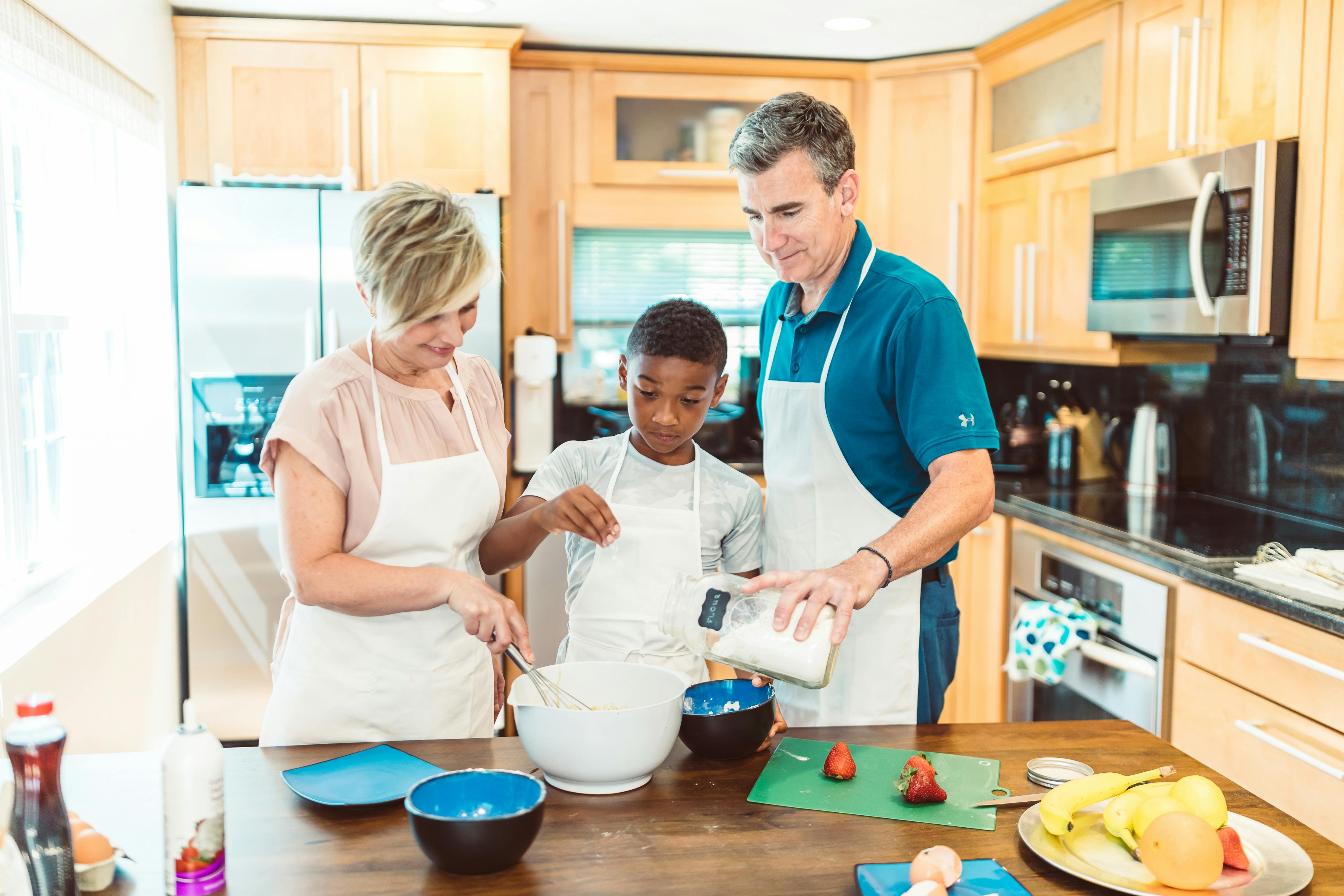 A Family Baking Together in the Kitchen · Free Stock Photo
