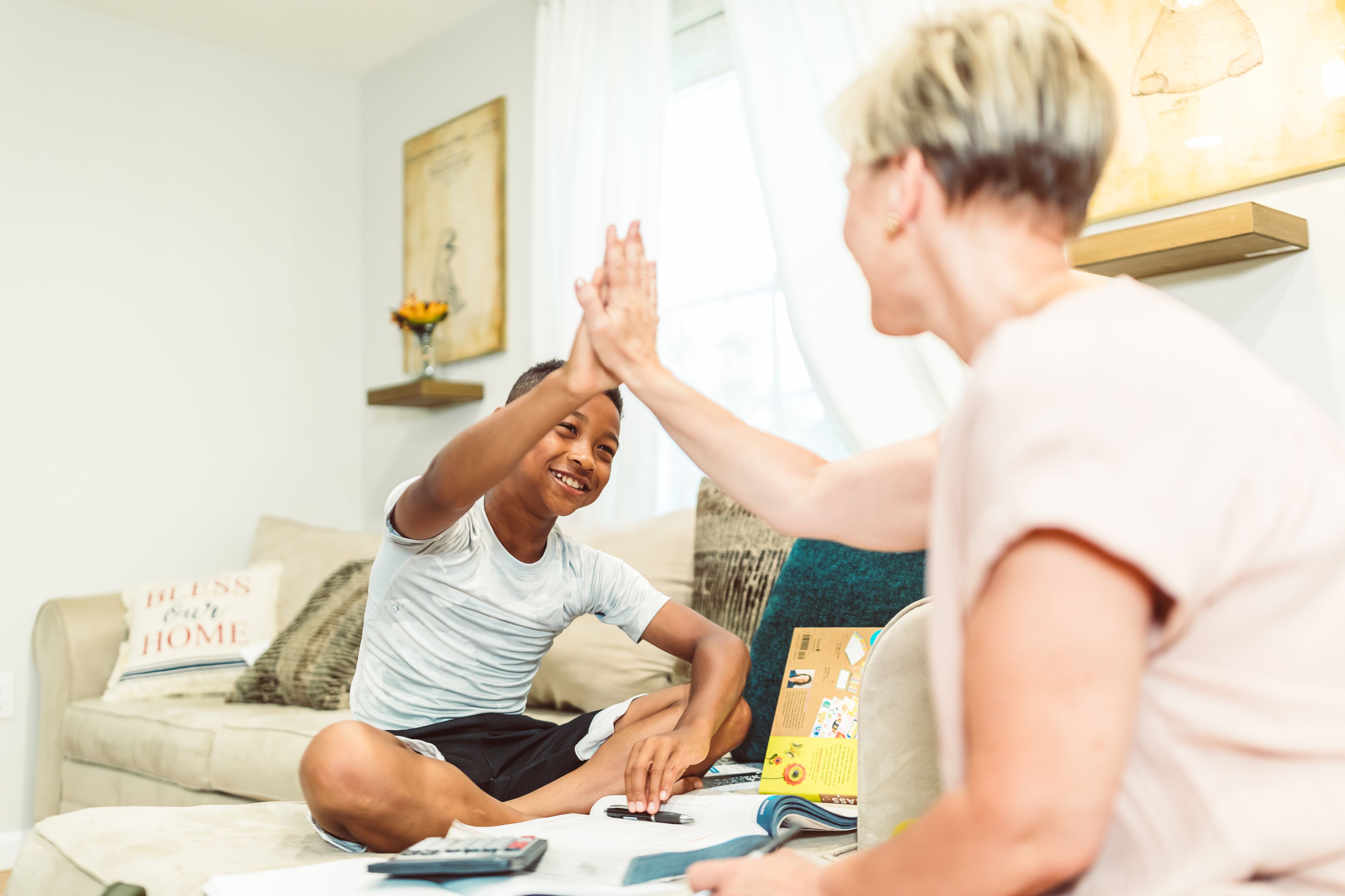A Family Holding A Sign With Quote · Free Stock Photo