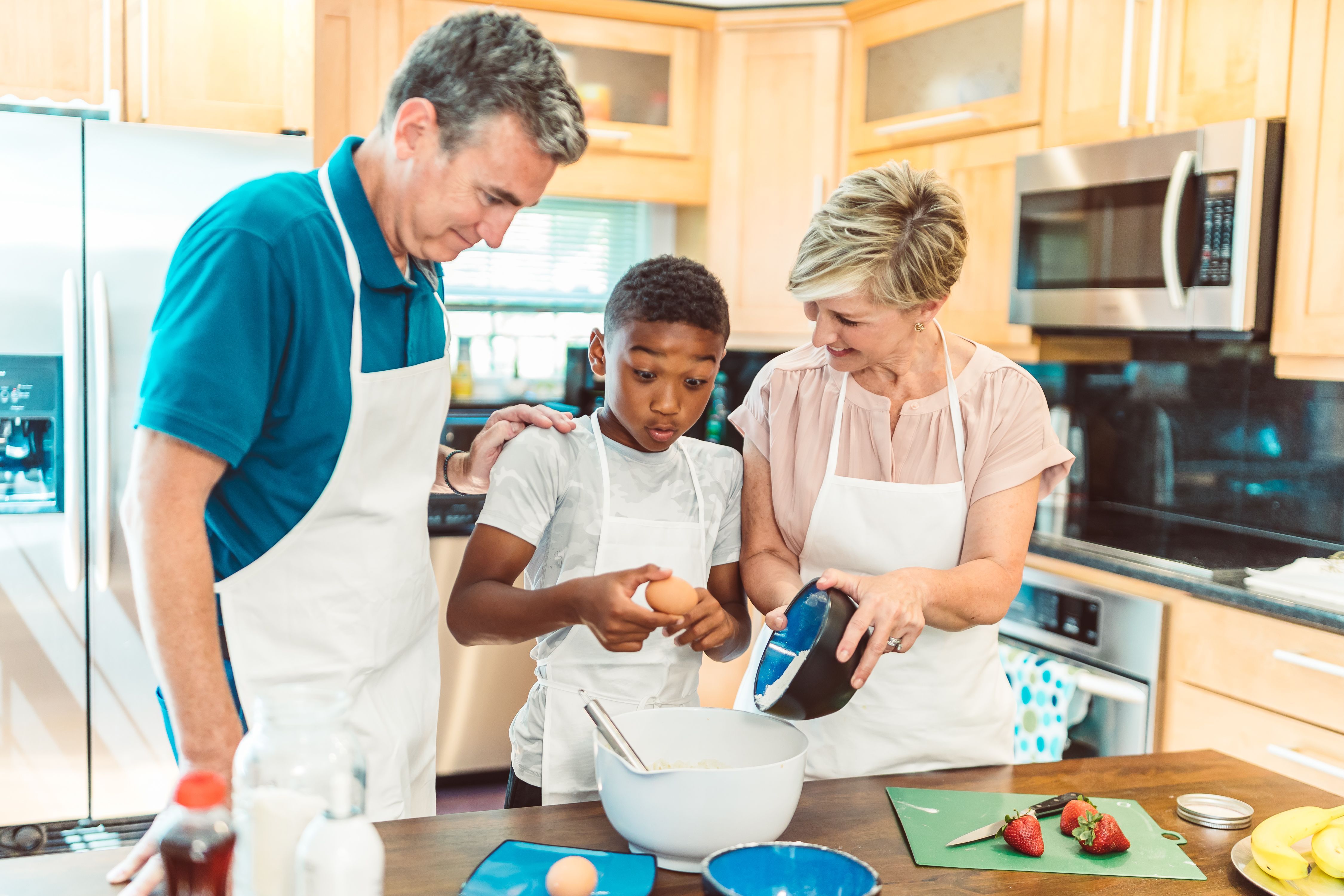 Family Preparing Food in the Kitchen · Free Stock Photo