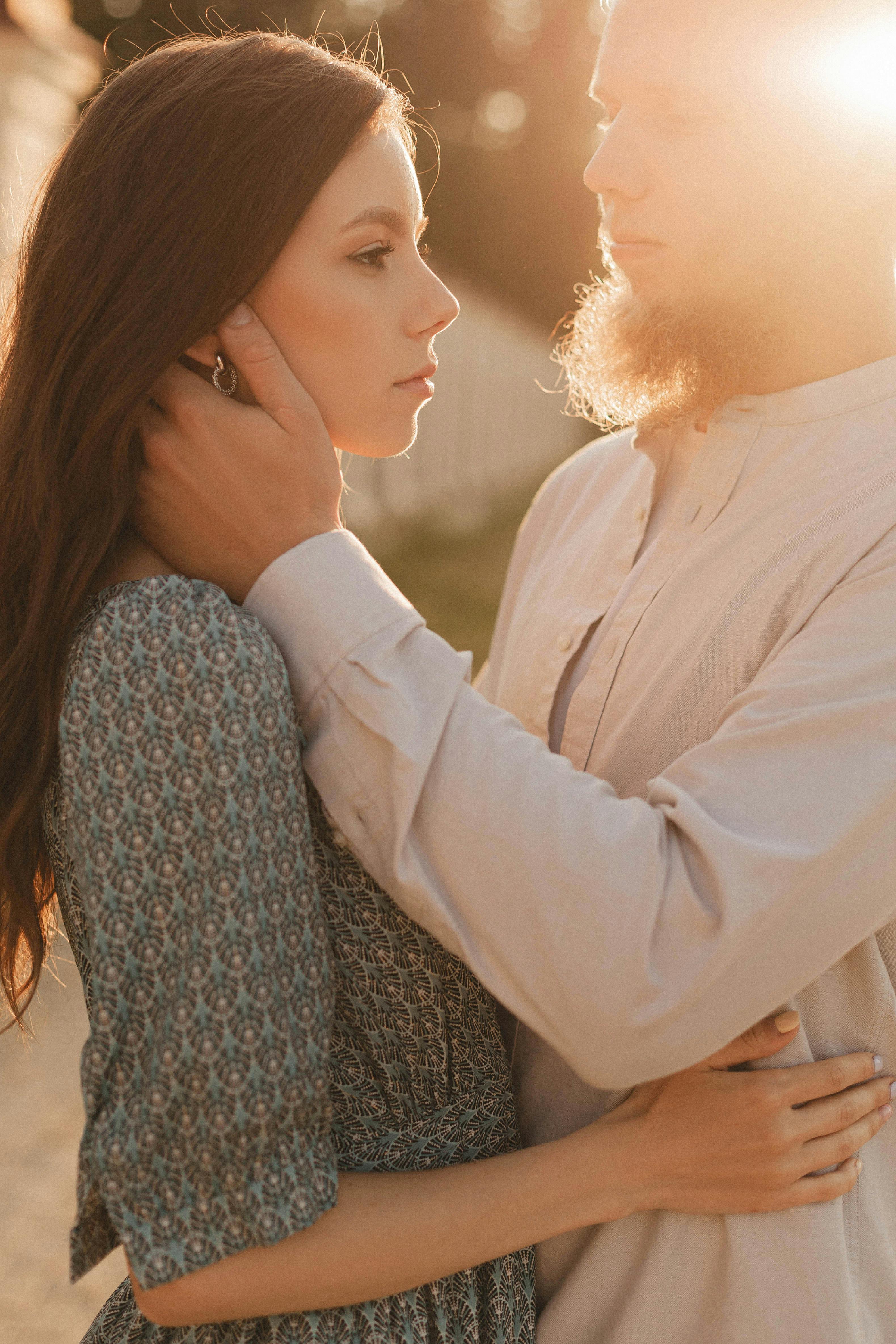 Man Touching Woman's Face · Free Stock Photo