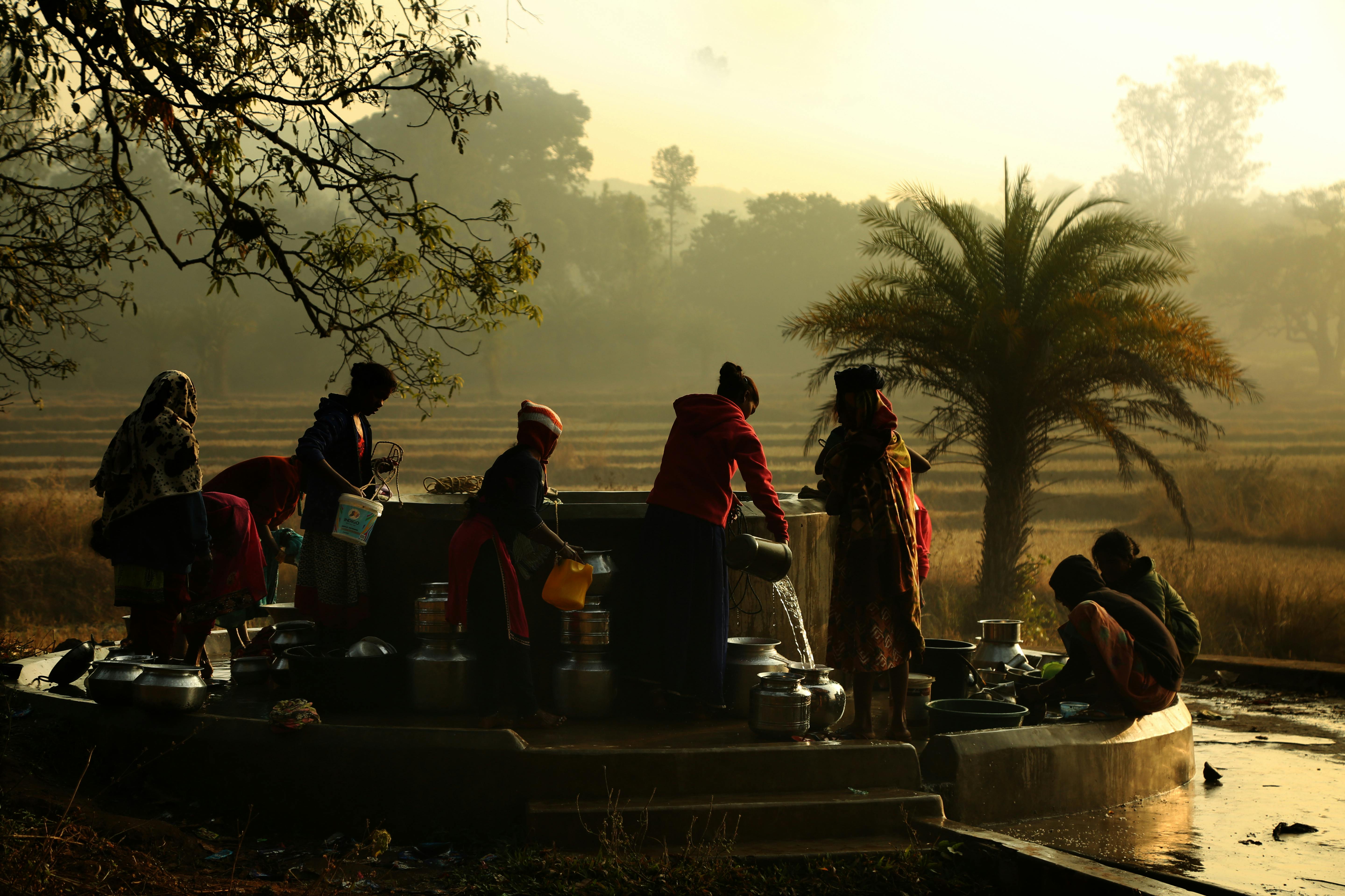 People getting Water from a Well · Free Stock Photo
