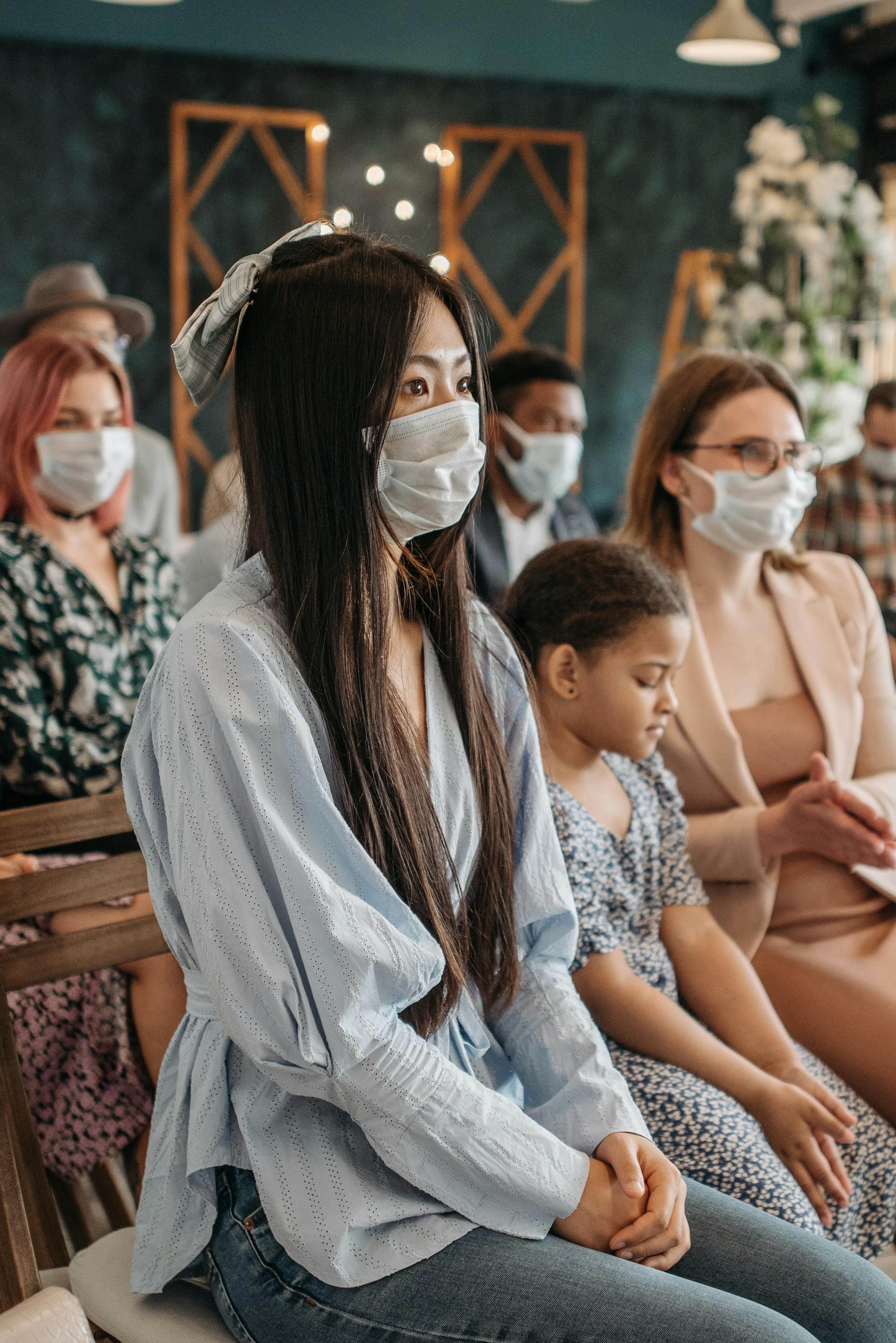 Man Wearing a Face Mask Praying · Free Stock Photo