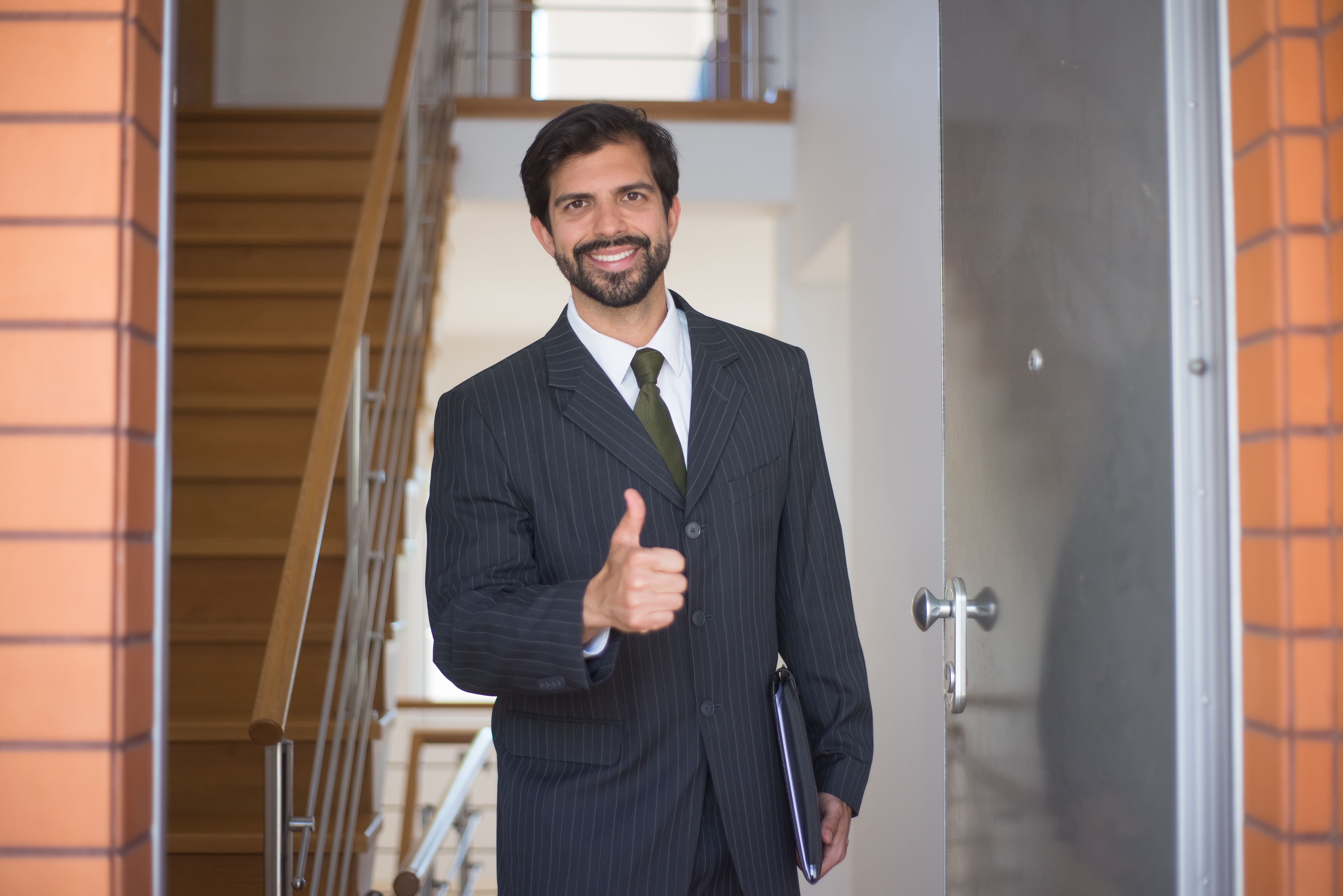 Real Estate Agent handing House Keys · Free Stock Photo