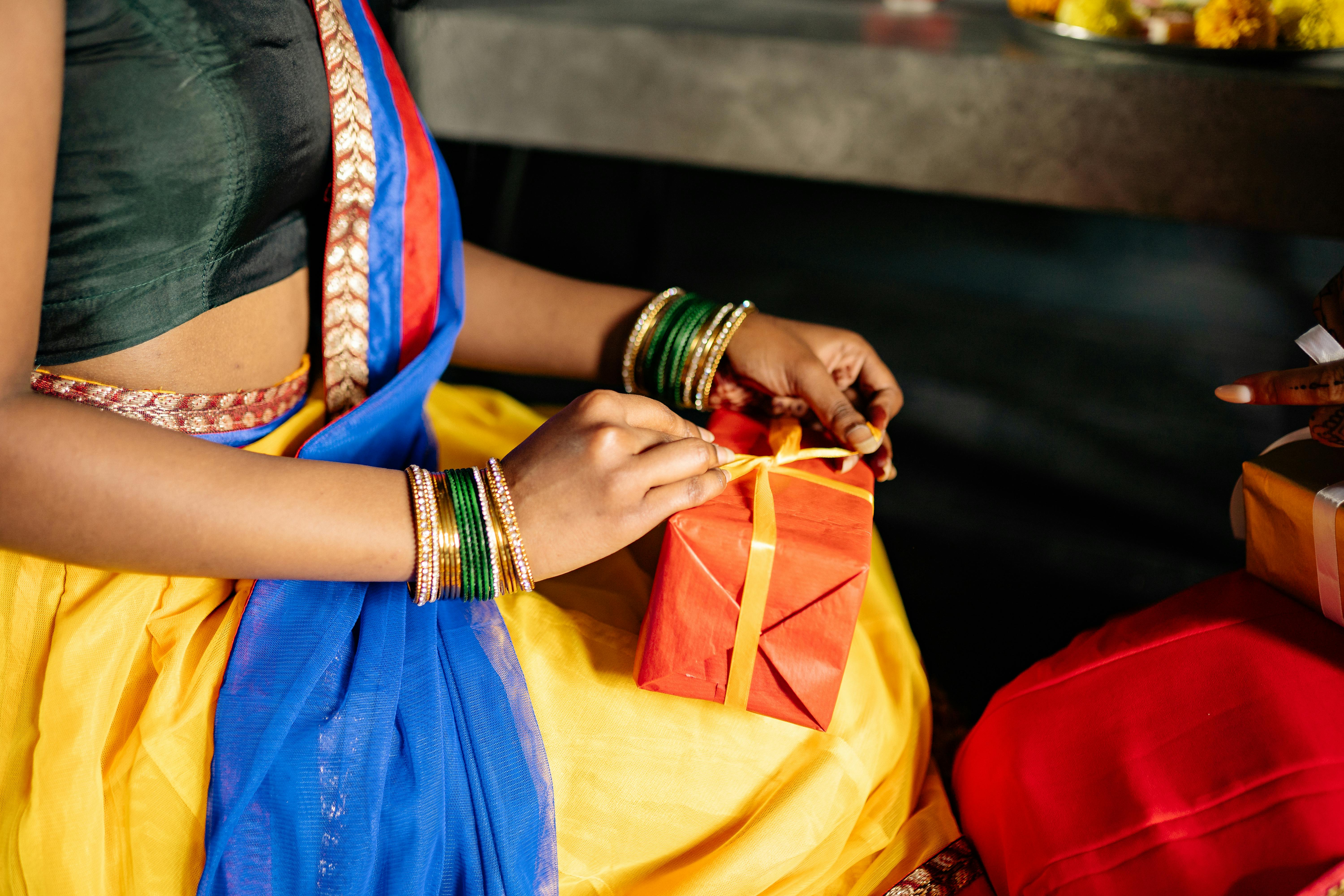 Indian Woman Wrapping Presents · Free Stock Photo