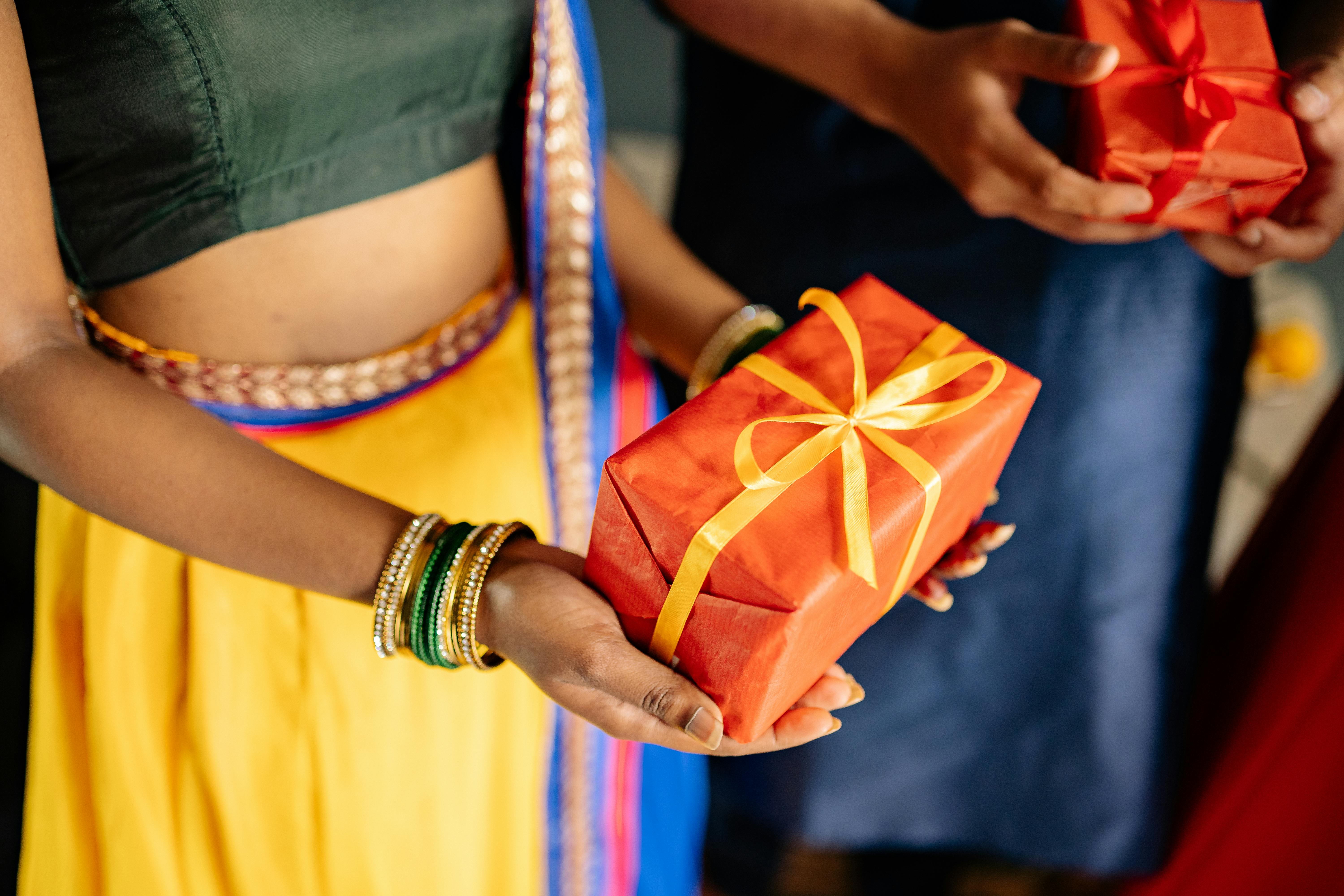 Person Holding a Gift · Free Stock Photo