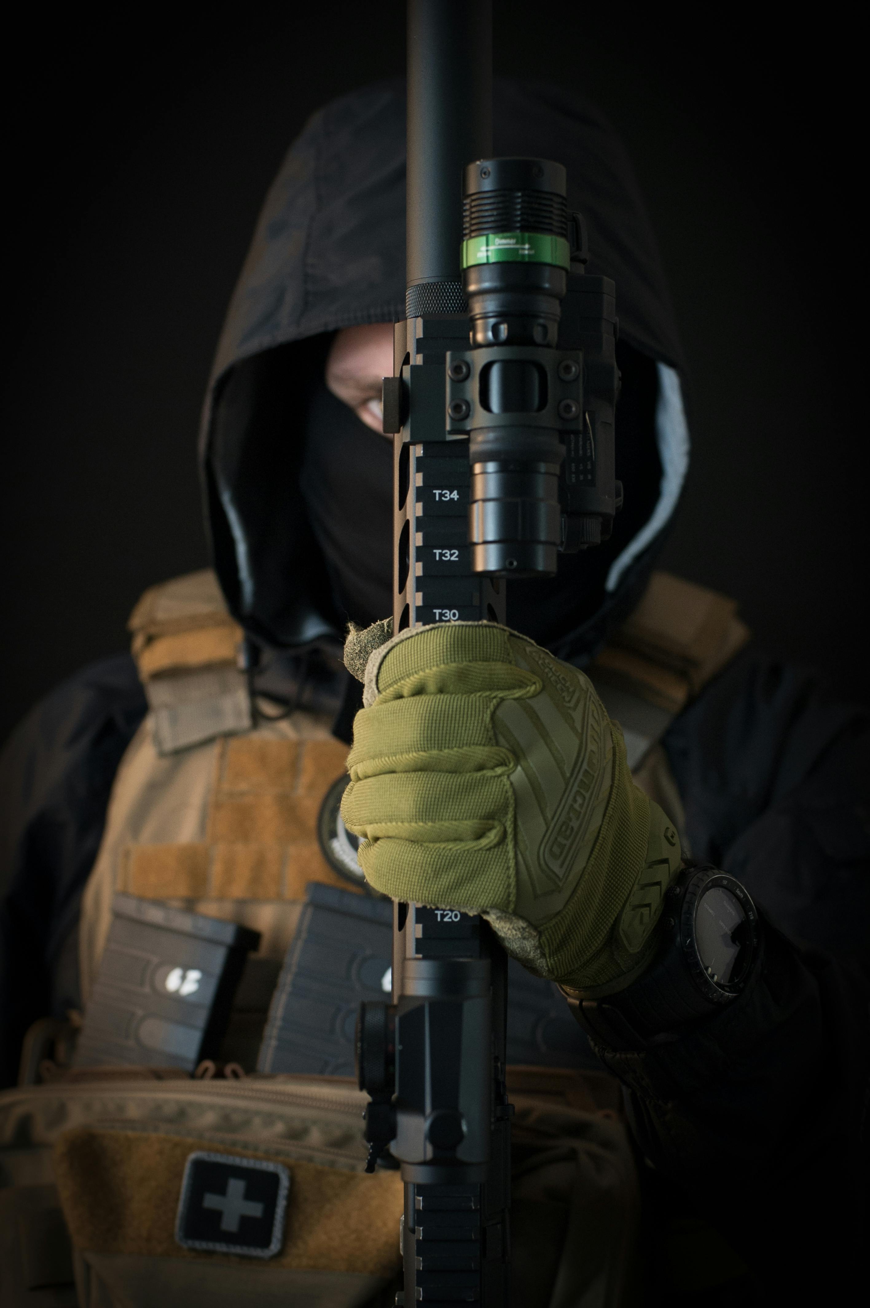 Person Holding a Sword · Free Stock Photo