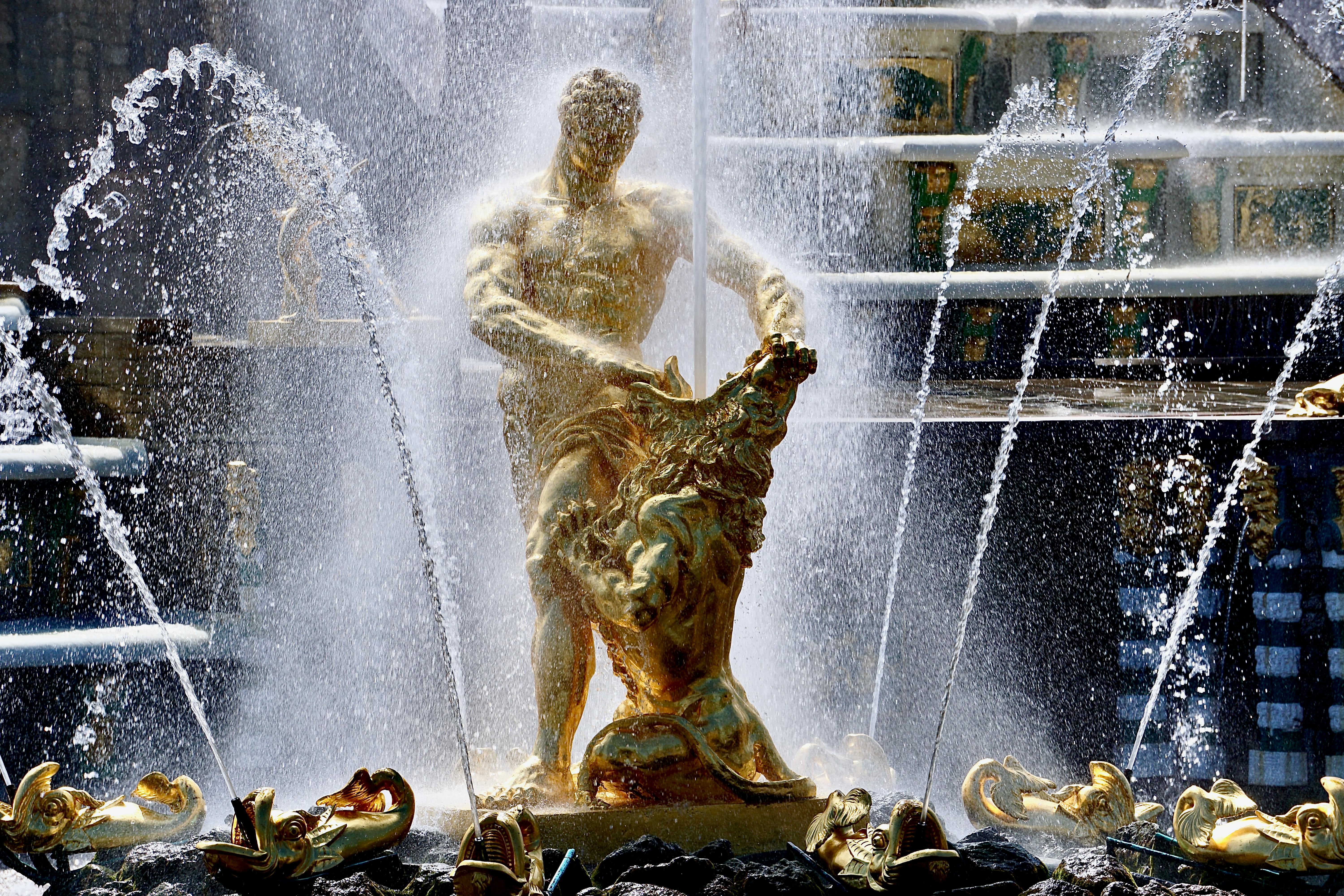 Gold Statue on Water Fountain · Free Stock Photo
