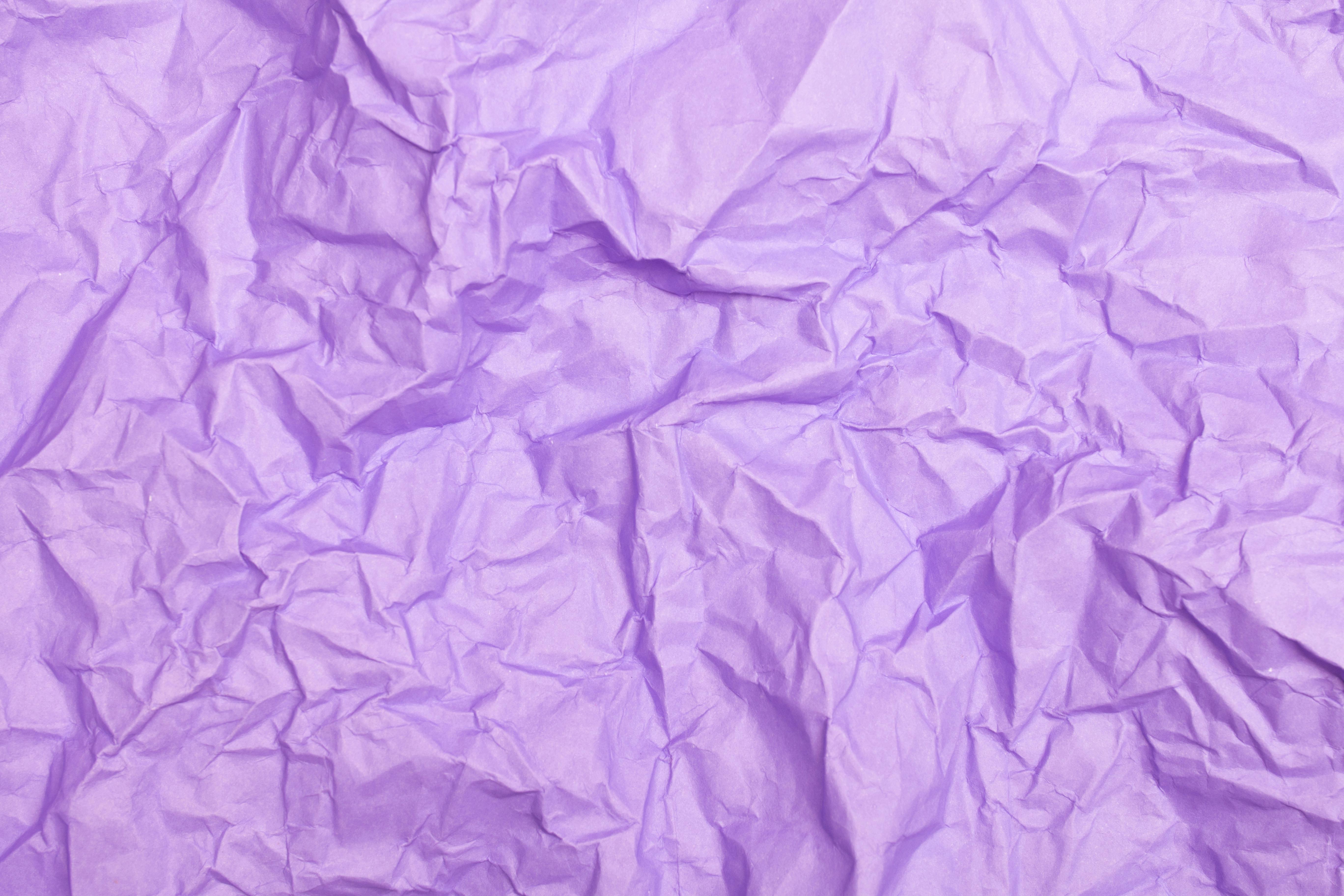 A Close-Up Shot of a Crumpled Purple Paper · Free Stock Photo