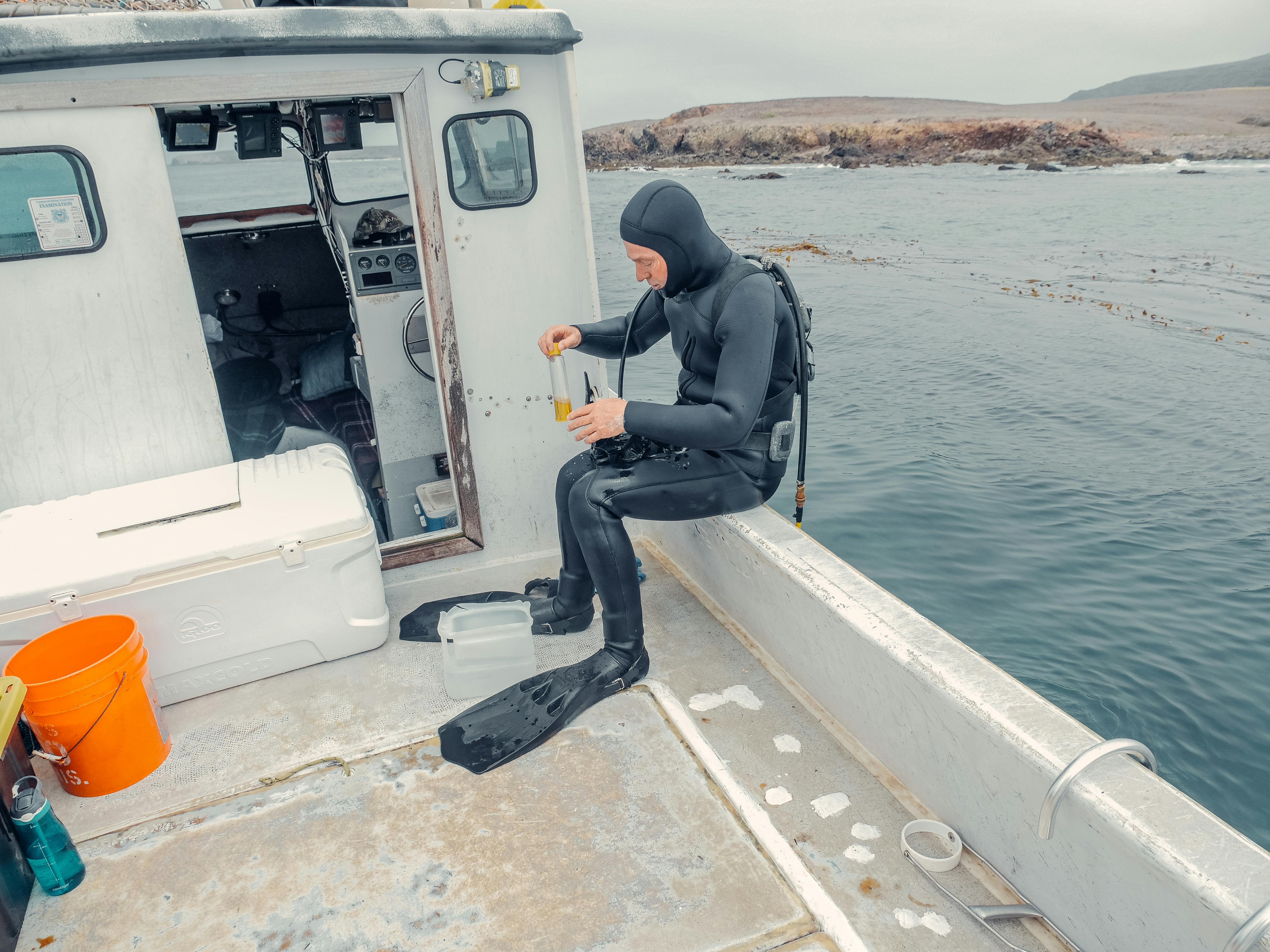 A Man Getting Water from the River · Free Stock Photo