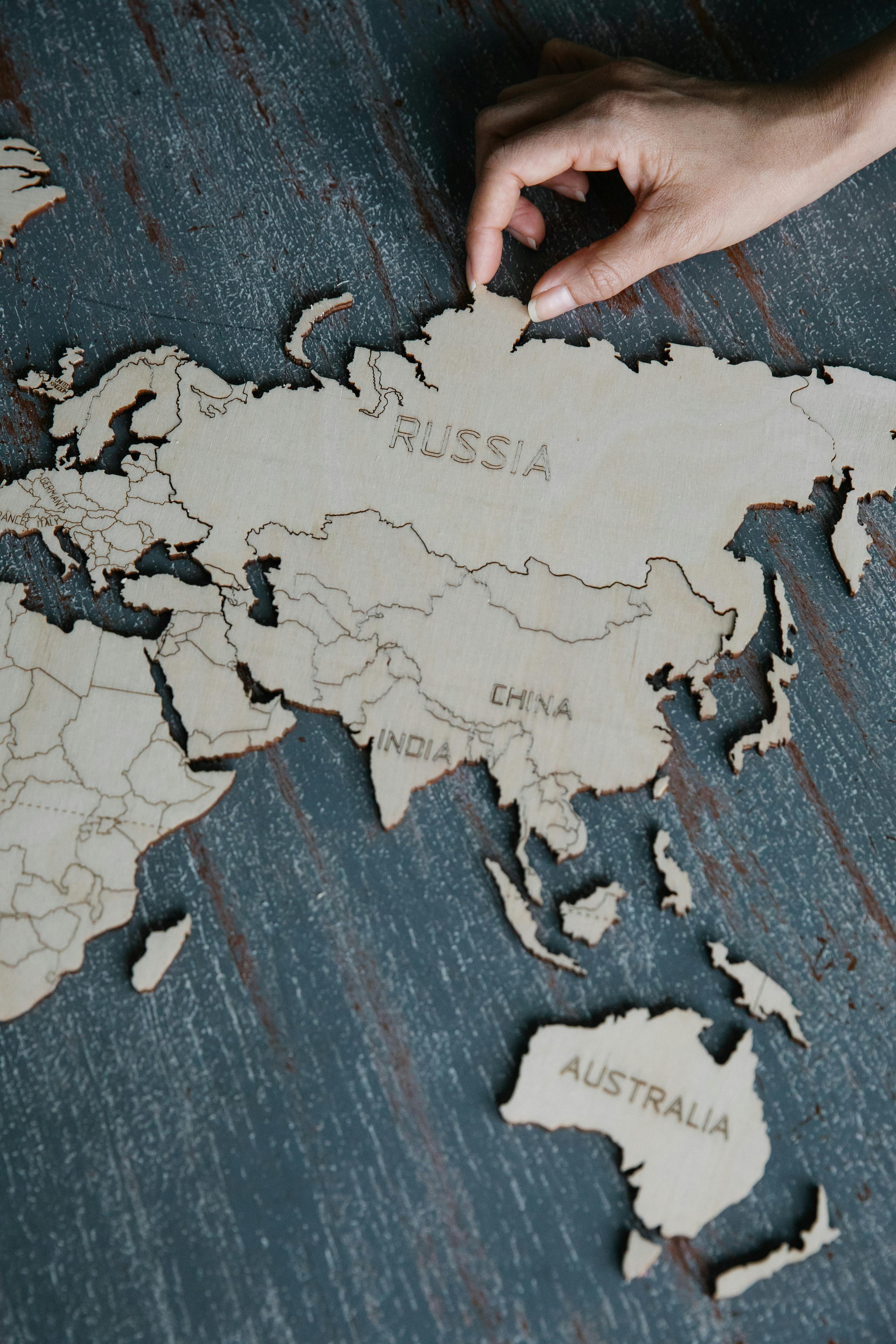 Wooden Map on Wooden Surface · Free Stock Photo