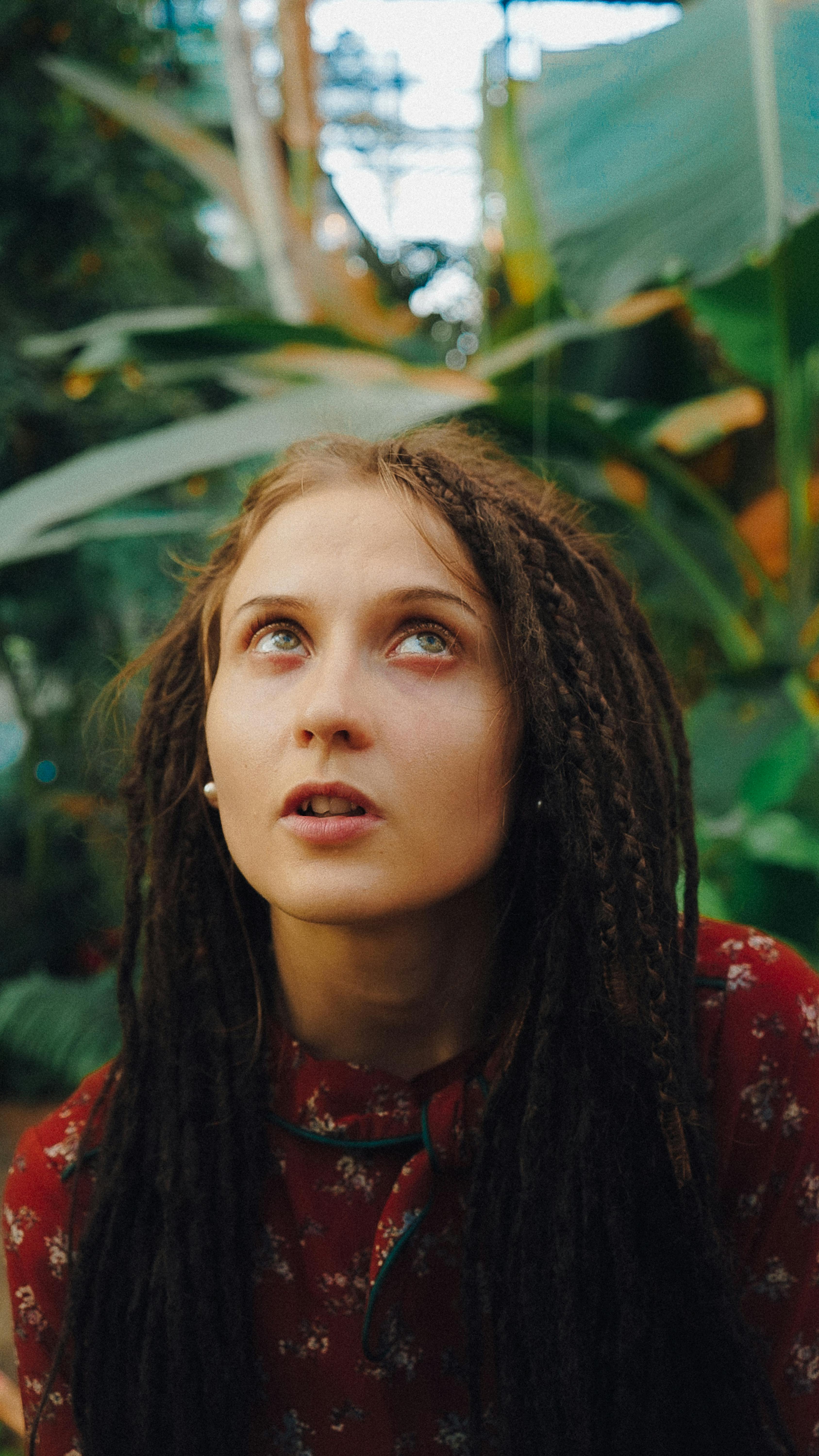 A Person in White Shirt with a Blurred Face · Free Stock Photo