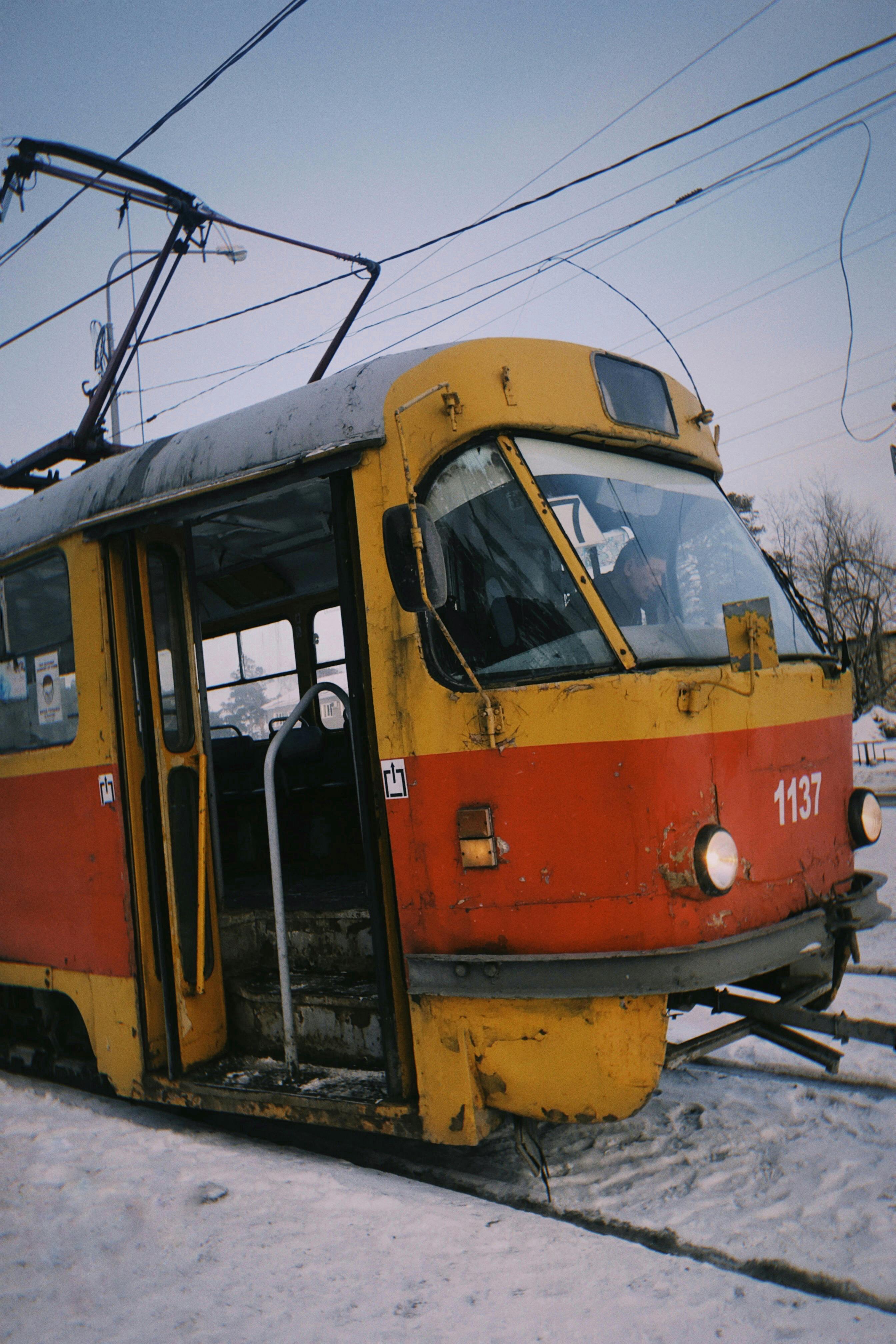 Front of an Old and Rusty Tram on a Tramway in Winter · Free Stock Photo