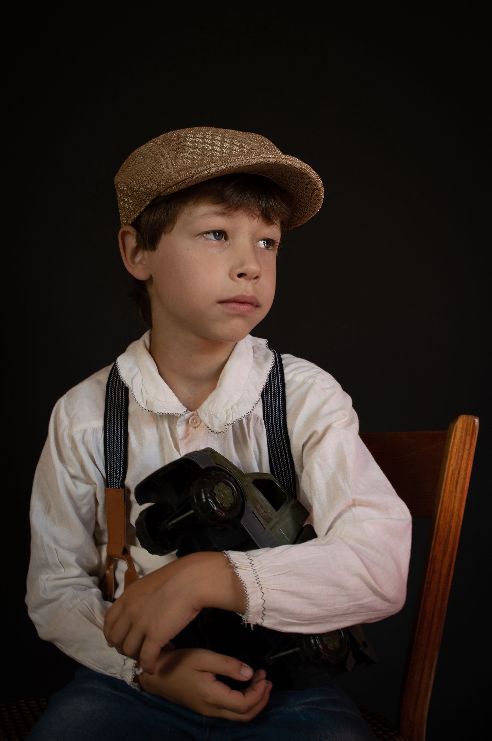 A Portrait of a Boy in a Dirty Beige Shirt · Free Stock Photo