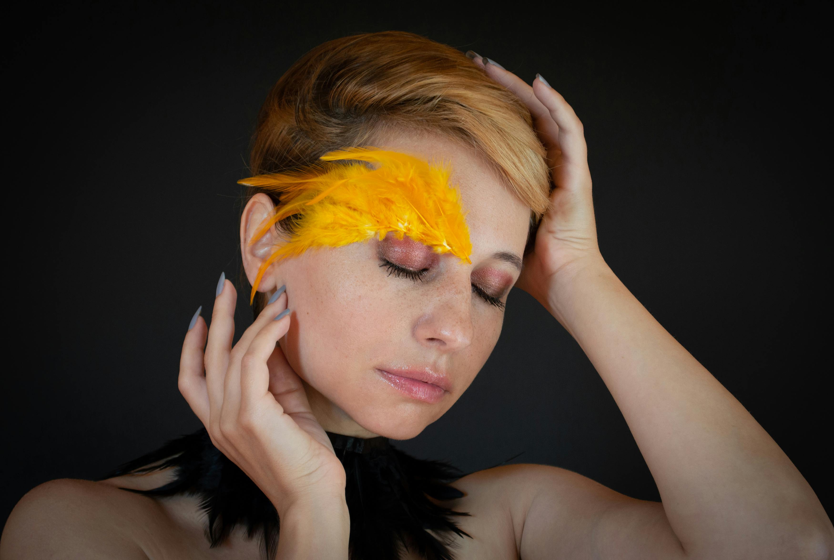 Portrait of Model in Dress Against Black Backdrop · Free Stock Photo