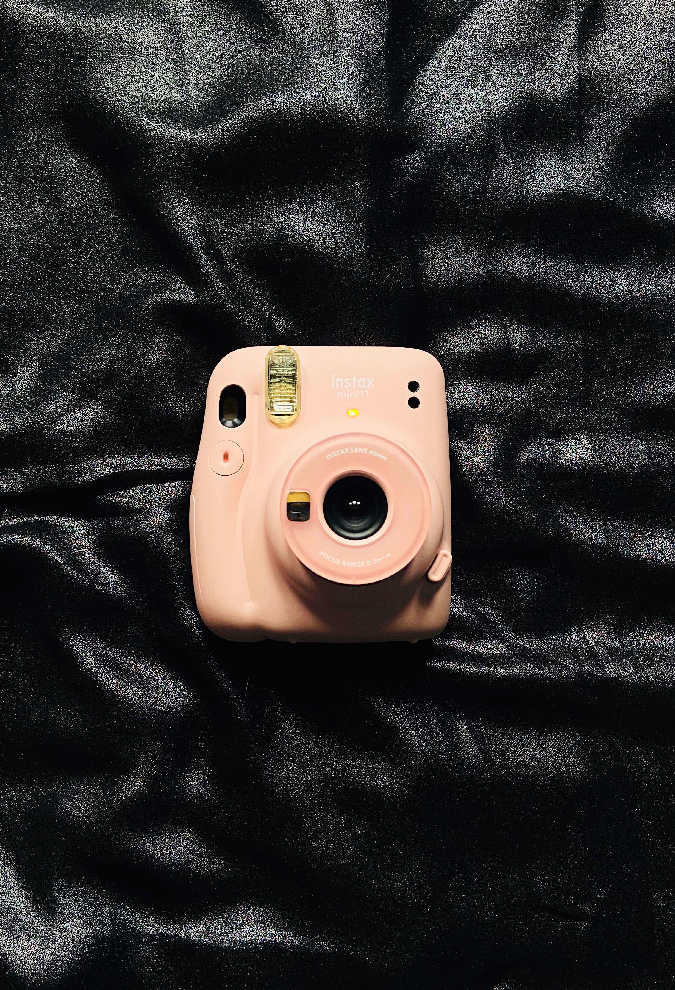 Close-Up Shot of a Pink Instax · Free Stock Photo