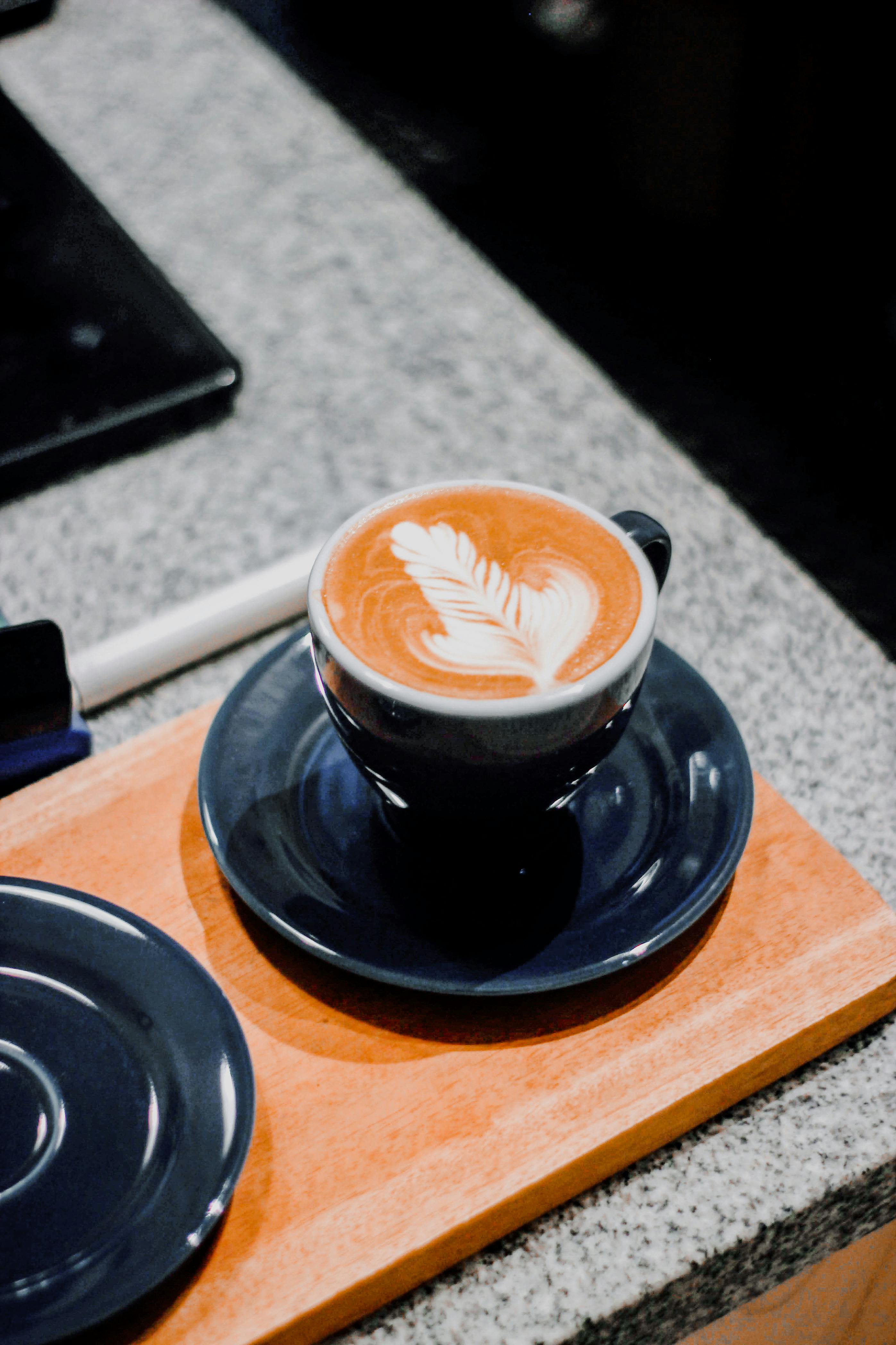 Coffee with Daisy Flower in White Cup · Free Stock Photo