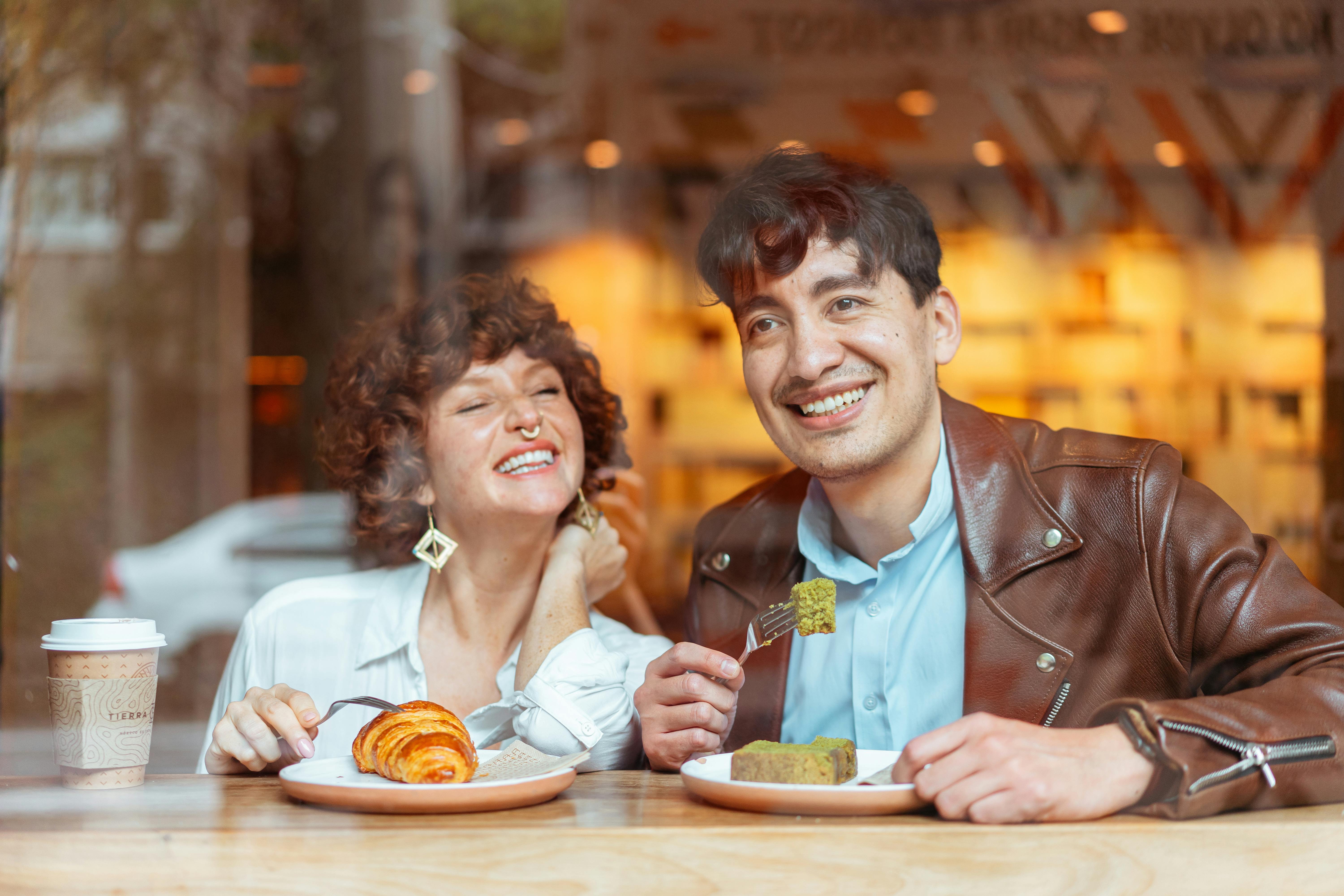 A Happy Couple Eating Together · Free Stock Photo