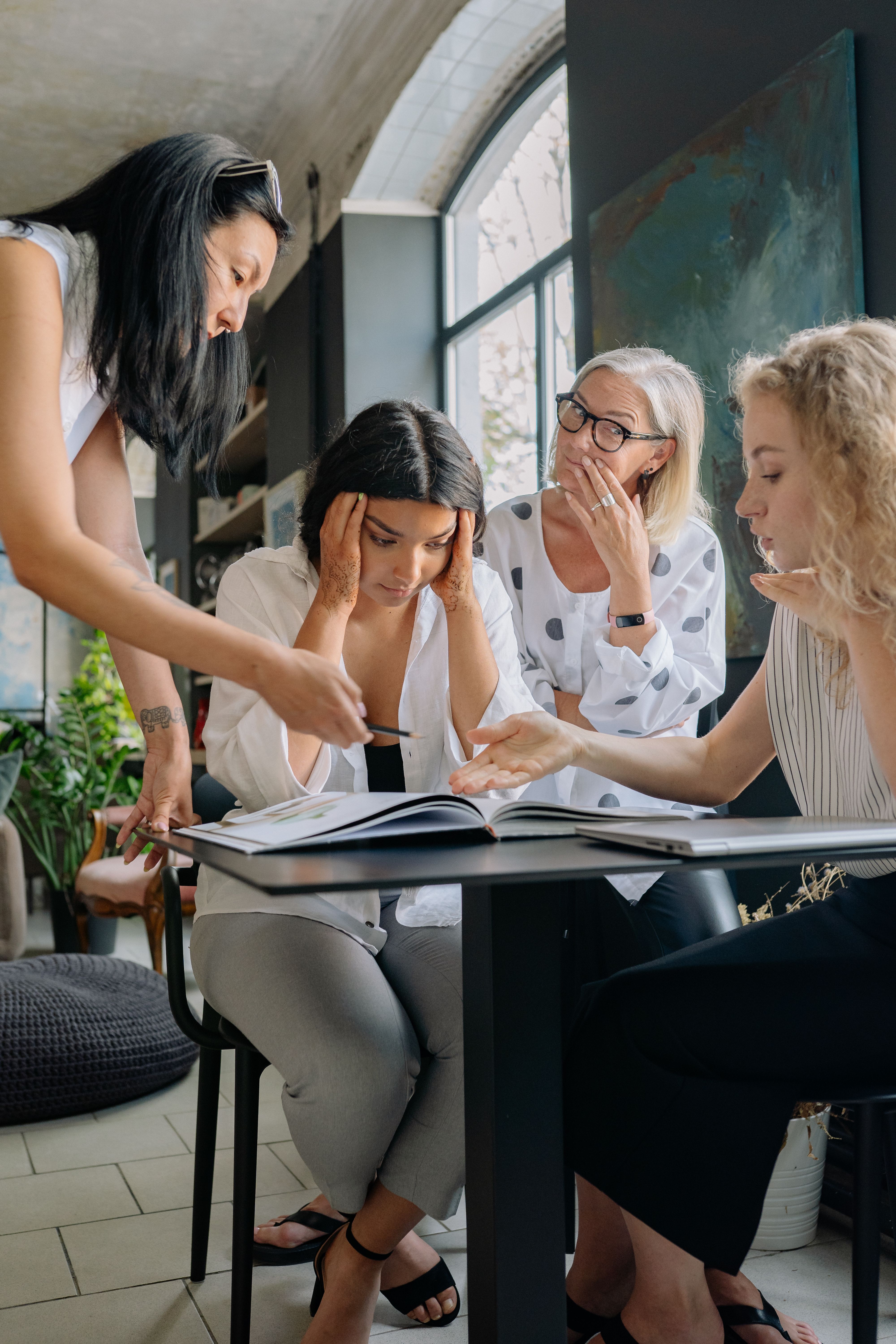 People Having a Discussion at Work · Free Stock Photo