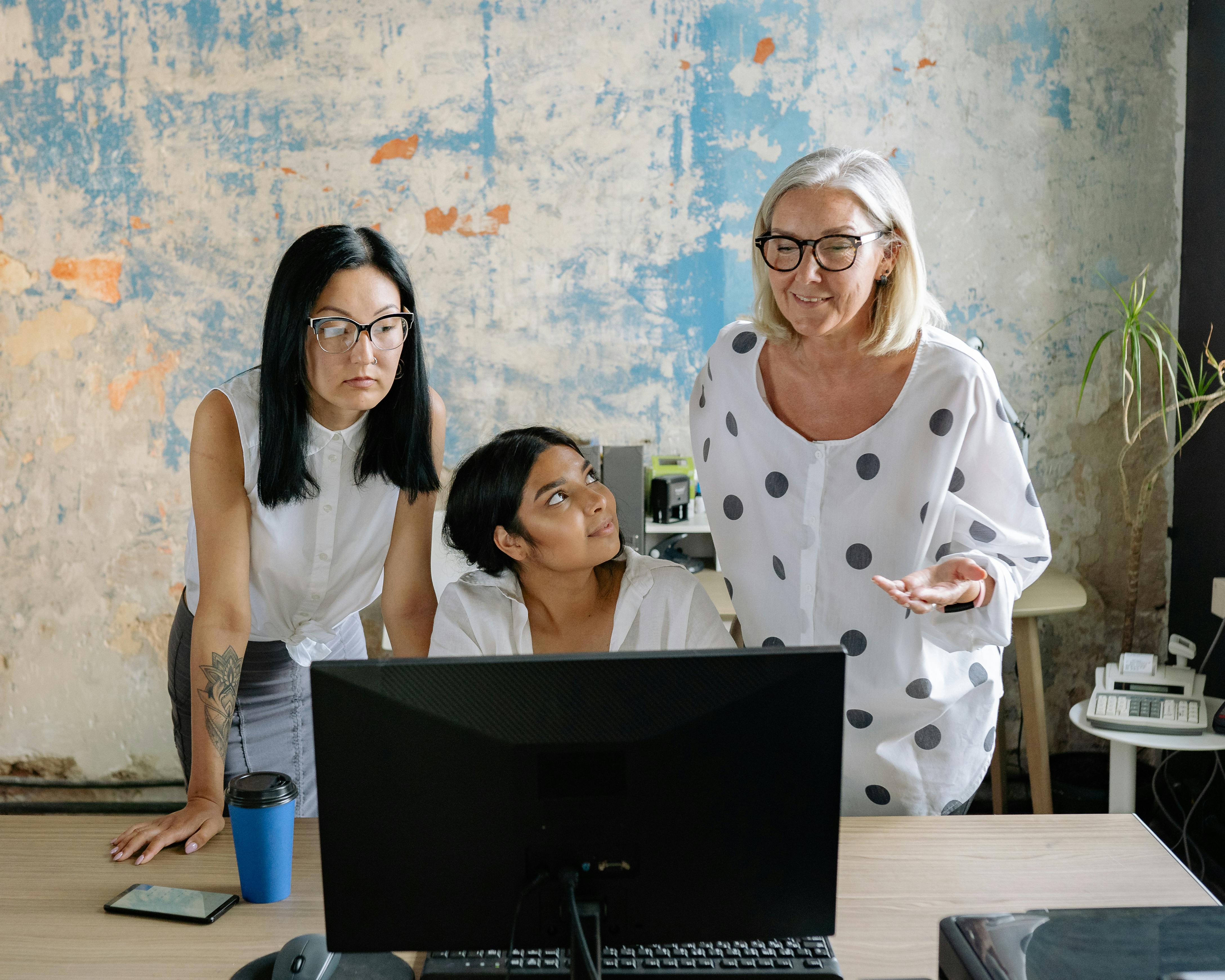 Three Person Sitting on Chair Near Table Inside Room · Free Stock Photo