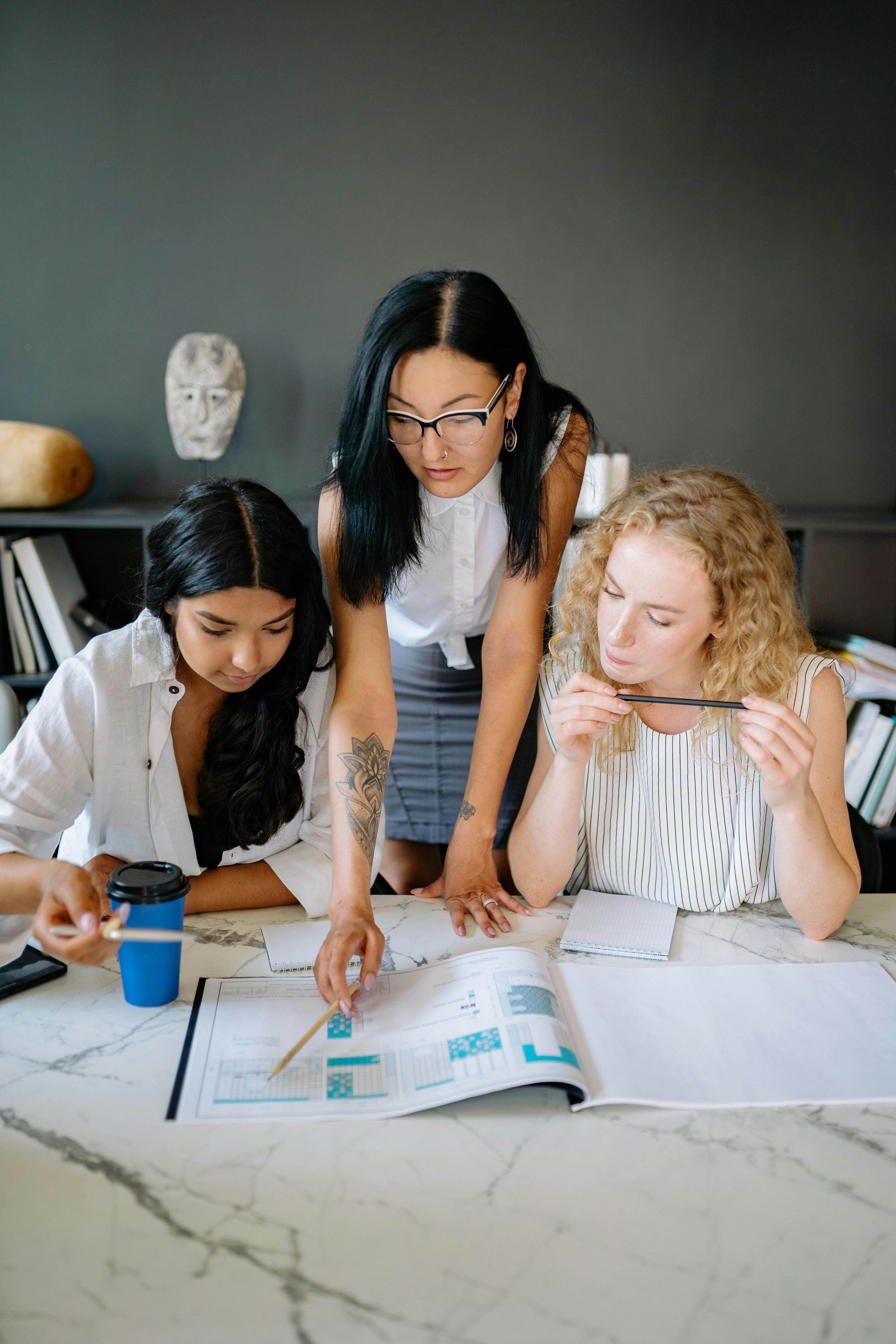 Three Women Working Together · Free Stock Photo
