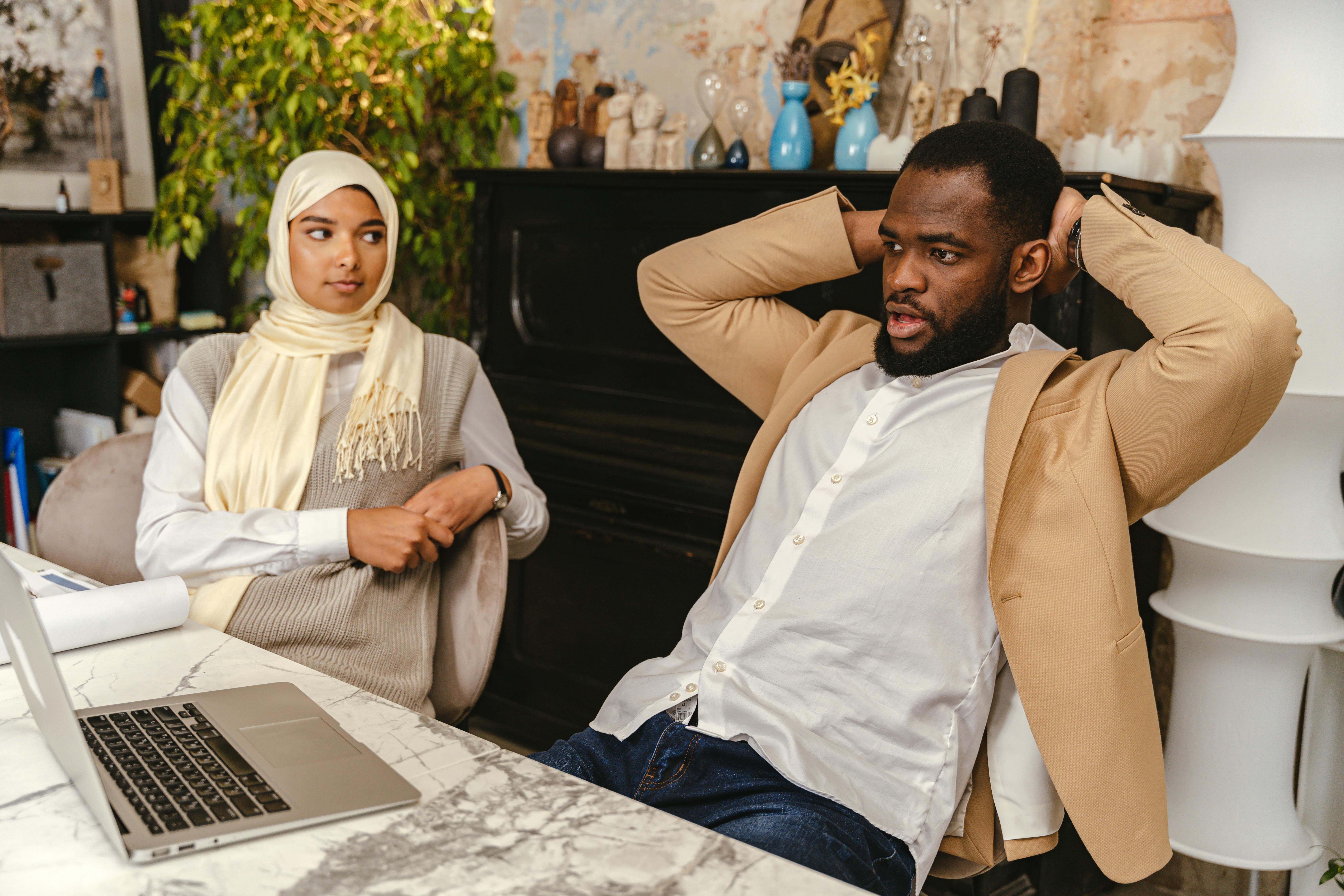 People Sitting and Talking in an Office · Free Stock Photo