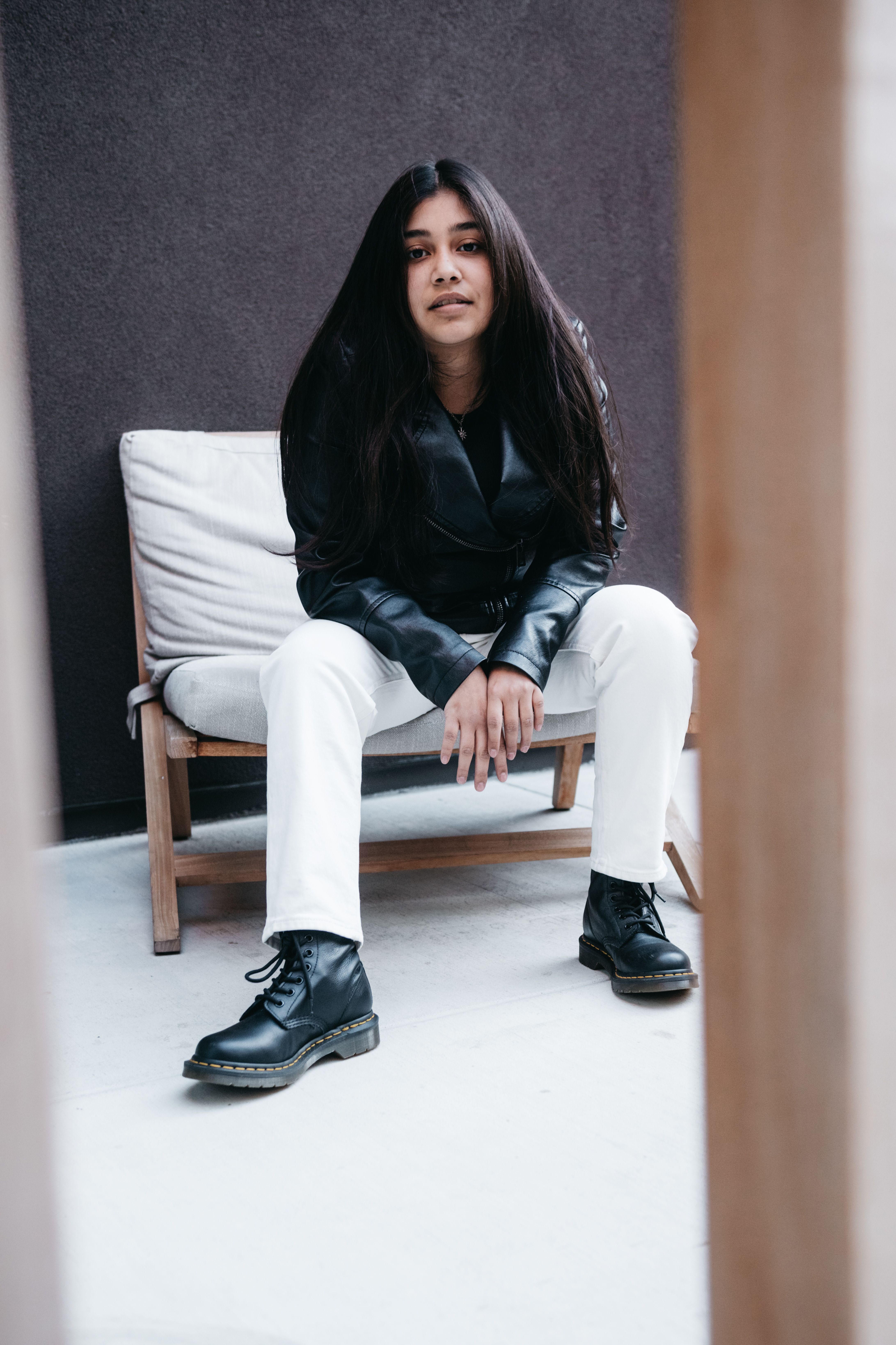 Woman Sitting on Chair Wearing Casual Clothing · Free Stock Photo