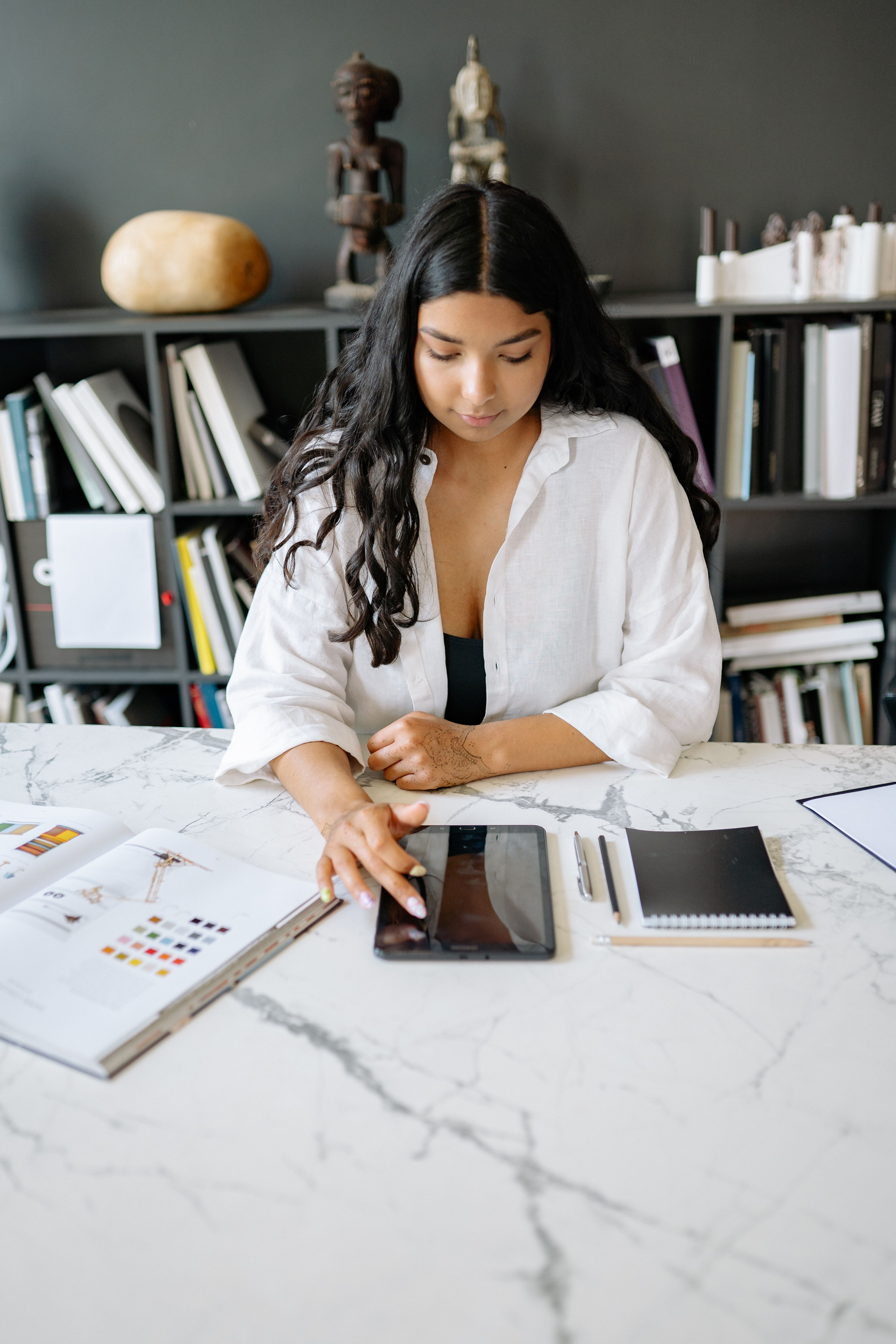 Woman Using Tablet in the Office · Free Stock Photo