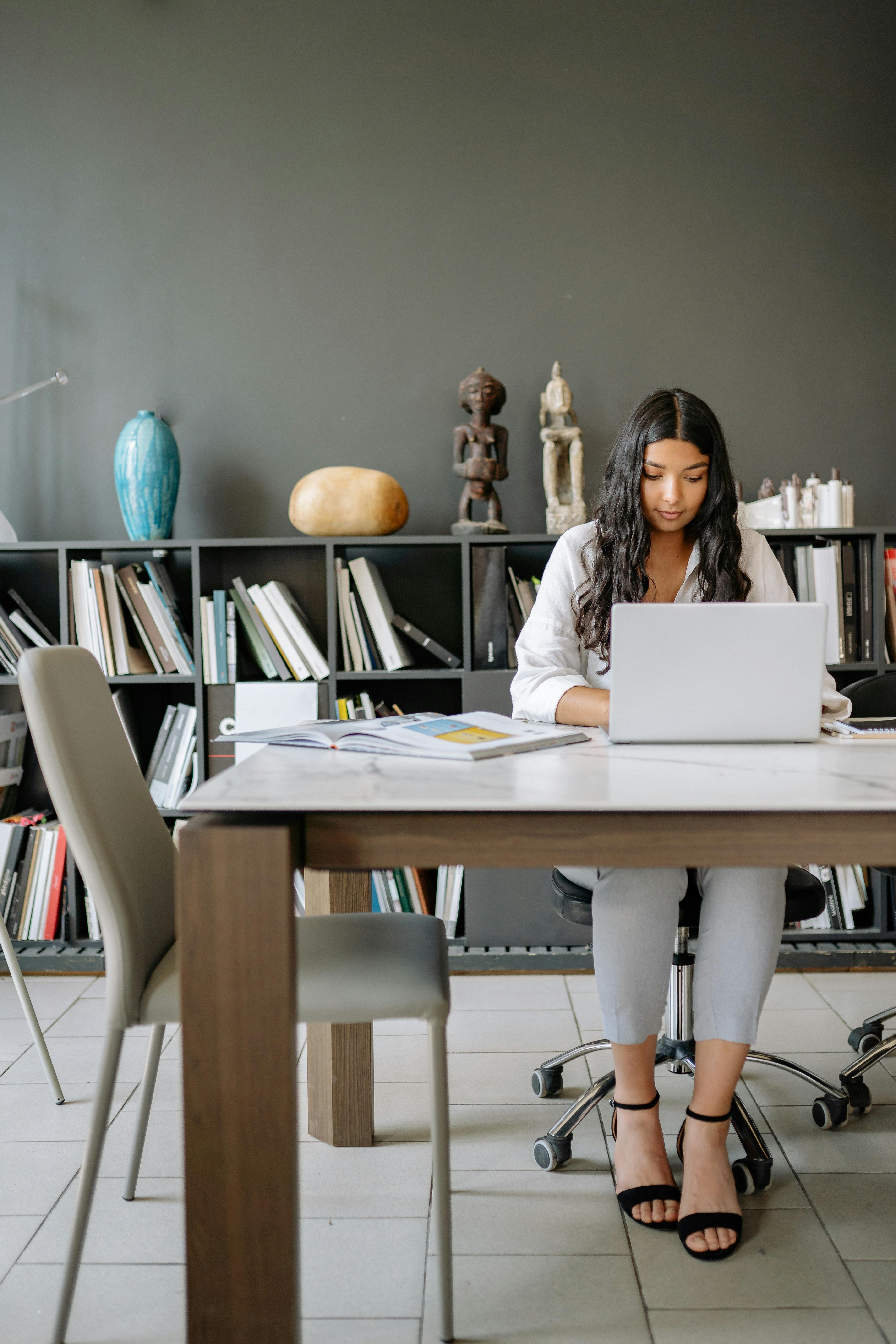 Person Holding a Binder Smiling · Free Stock Photo