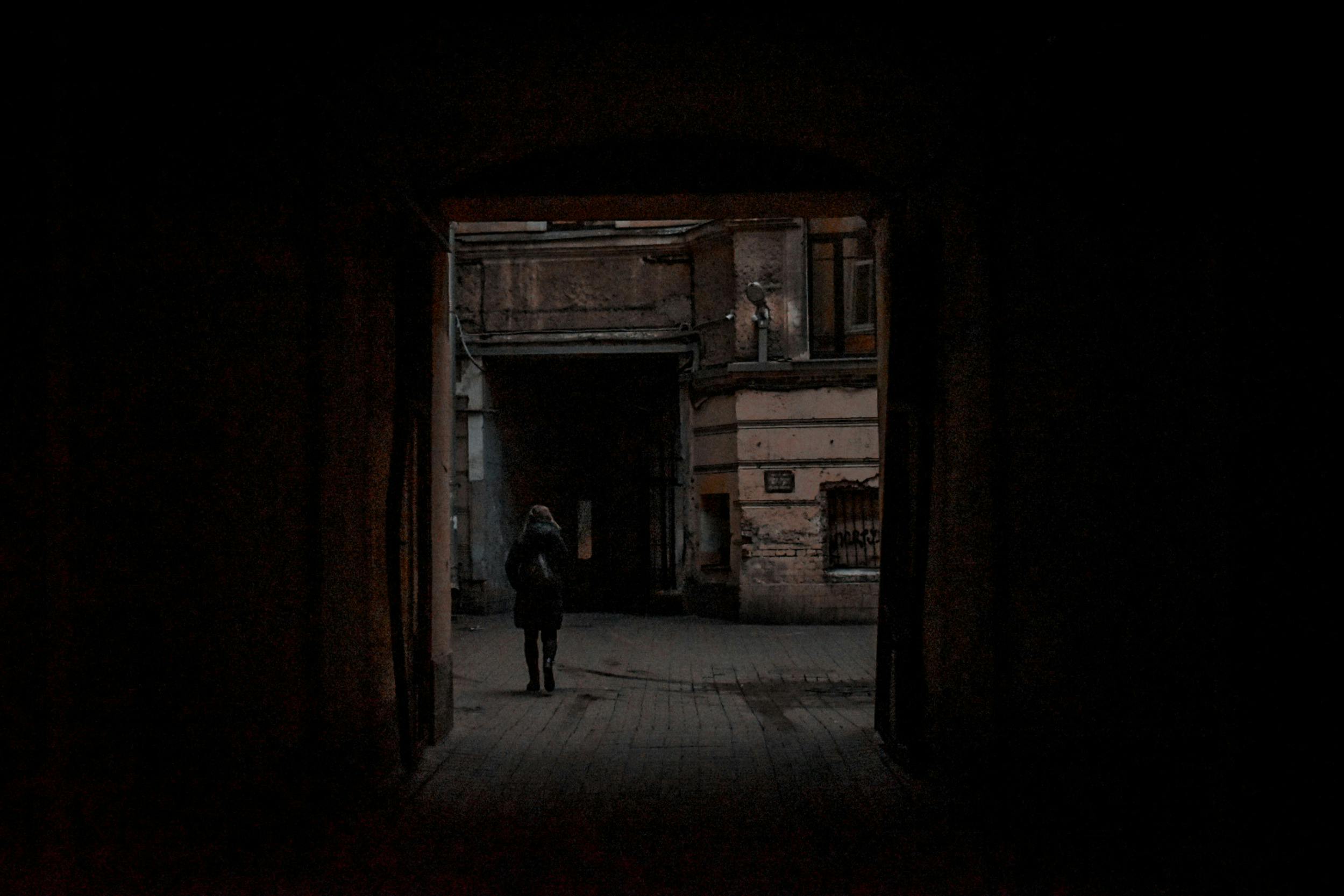 Person Between Tiled Walls · Free Stock Photo