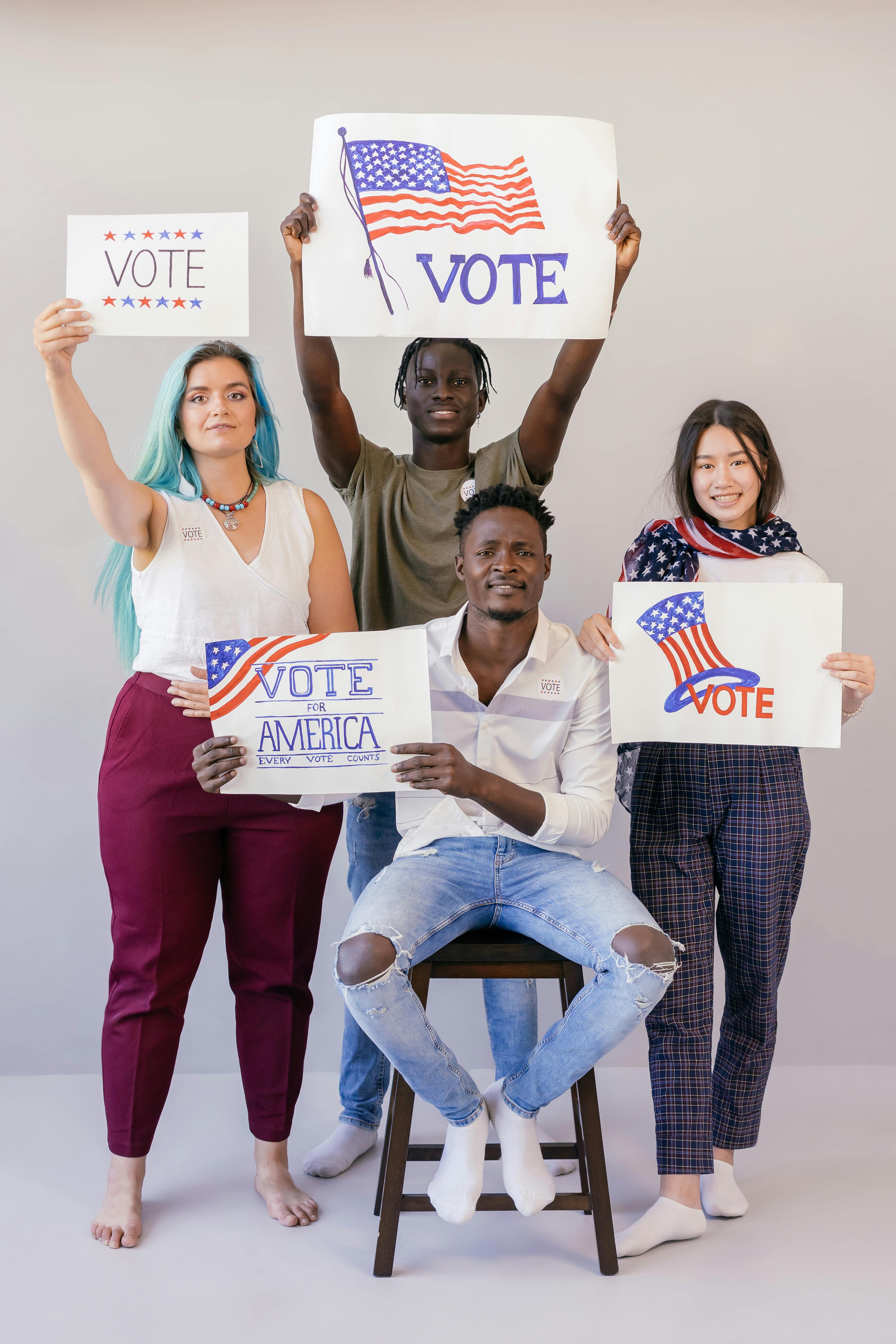 Group of People Holding Election Banners · Free Stock Photo