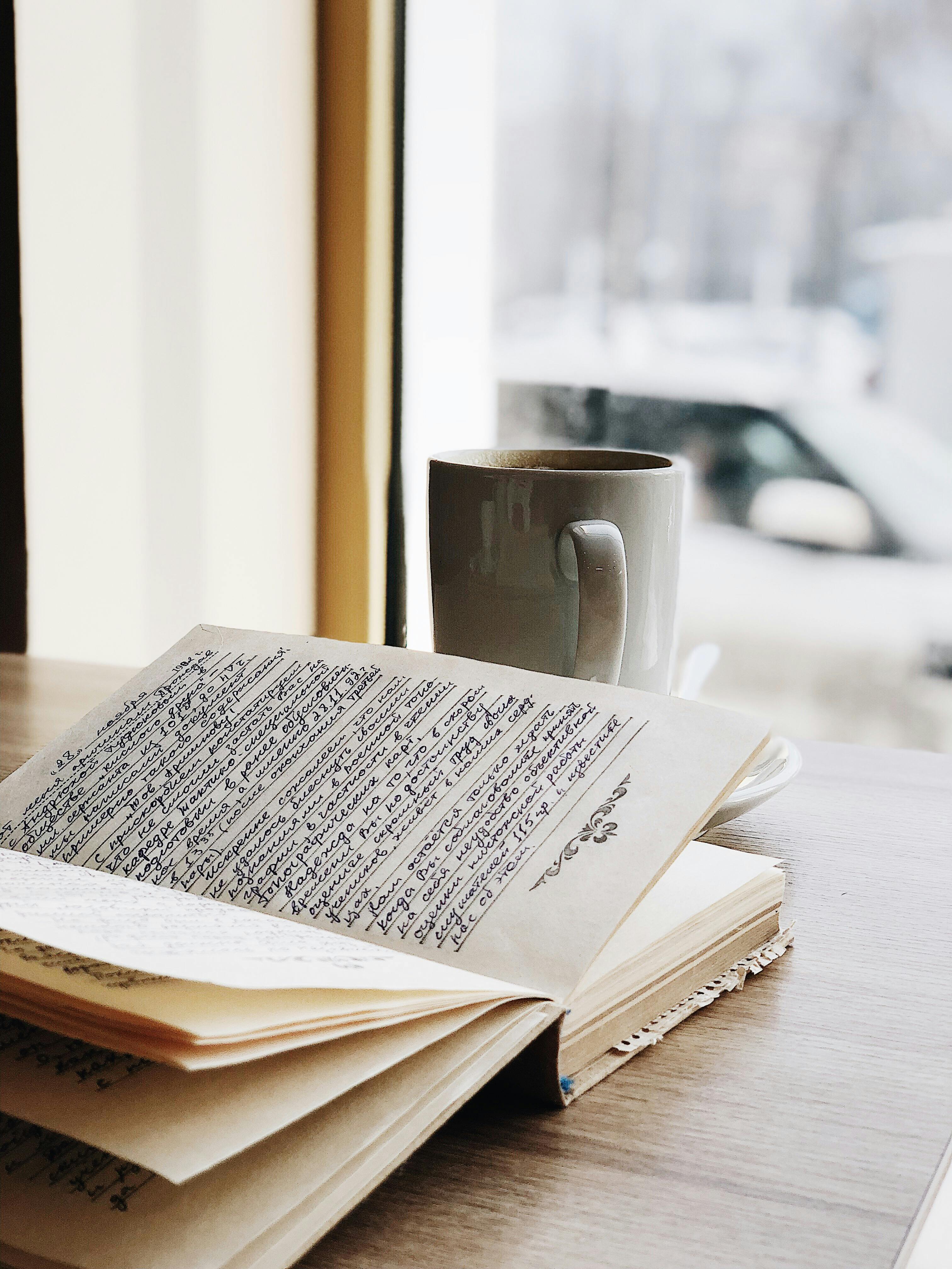 Book Beside a Mug · Free Stock Photo